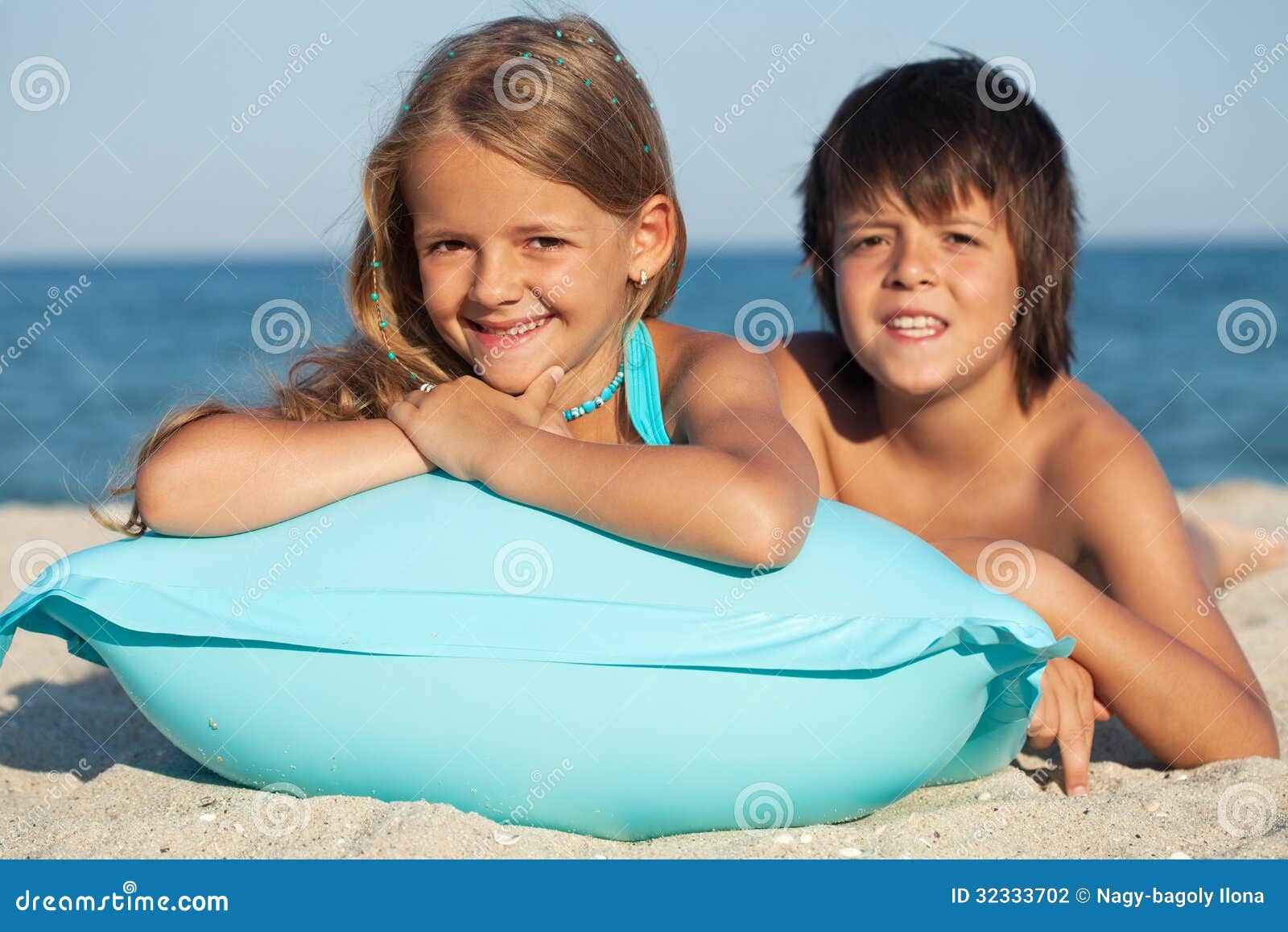 Kids with Inflatable Raft at the Beach Stock Photo - Image of outdoor ...