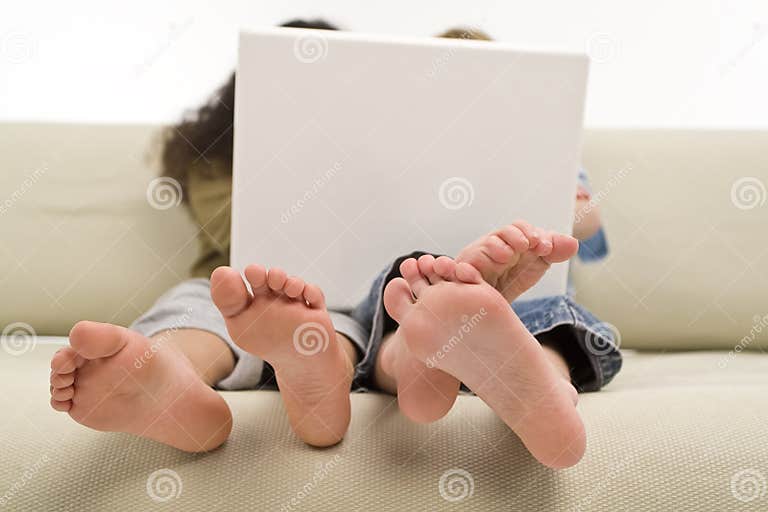Kids on the Internet stock image. Image of barefoot, concept - 6716941