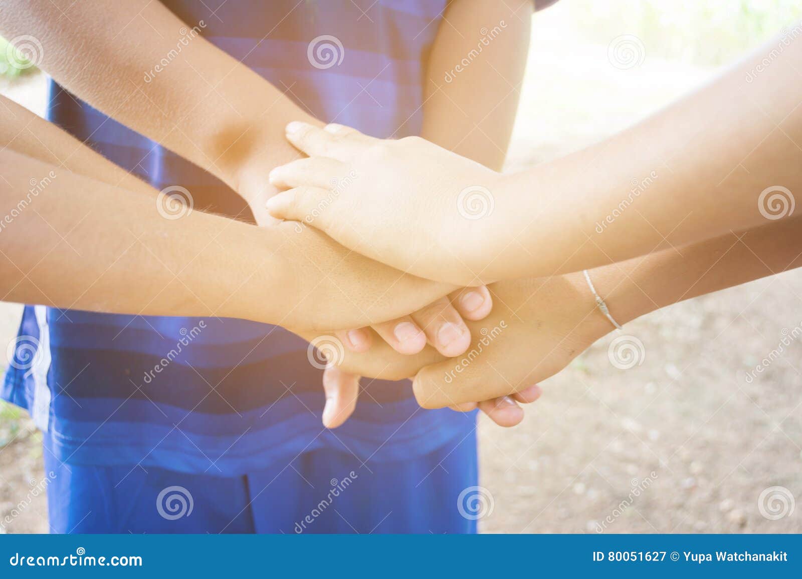 Kids join hands stock image. Image of teamwork, hand - 80051627