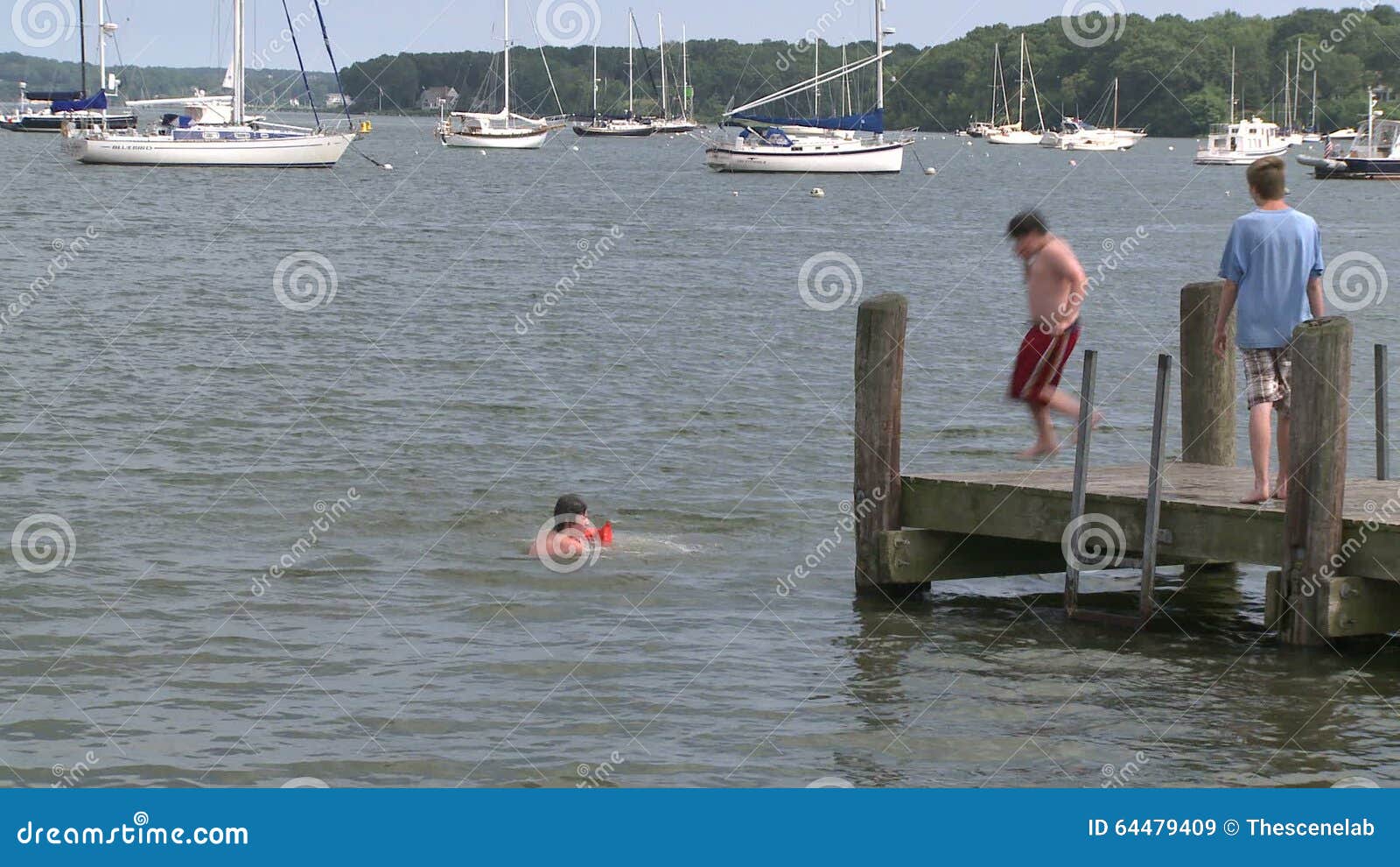 Kids Jump Off Pier into Water (3 of 3) Stock Video - Video of clouds ...