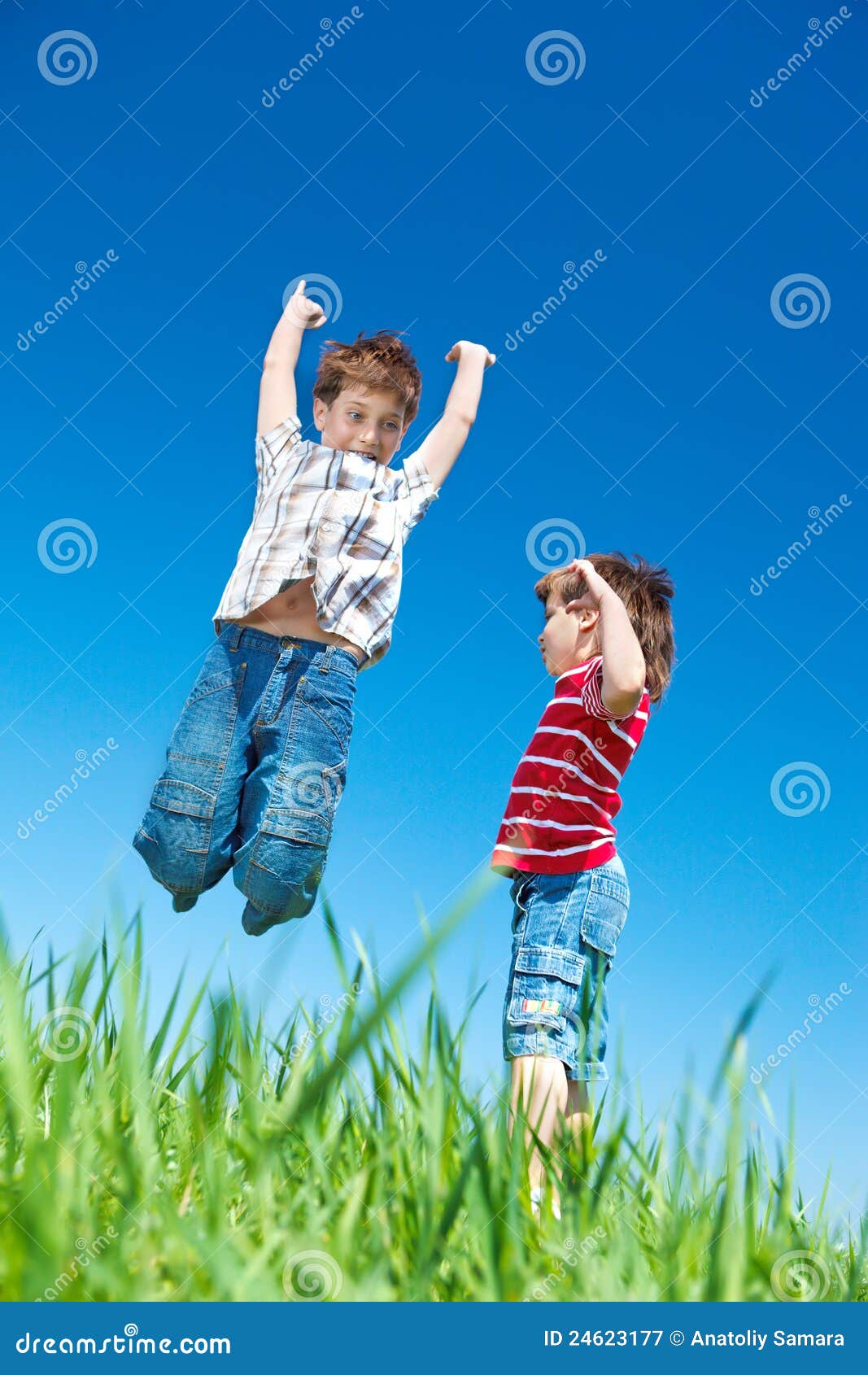 Kids jumping stock image. Image of countryside, colorful - 24623177