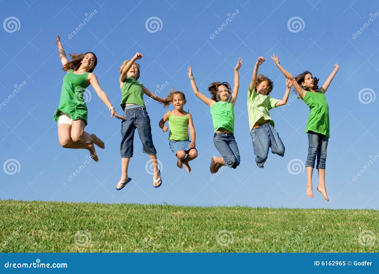 Kids jumping stock image. Image of boys, children, team - 6162965