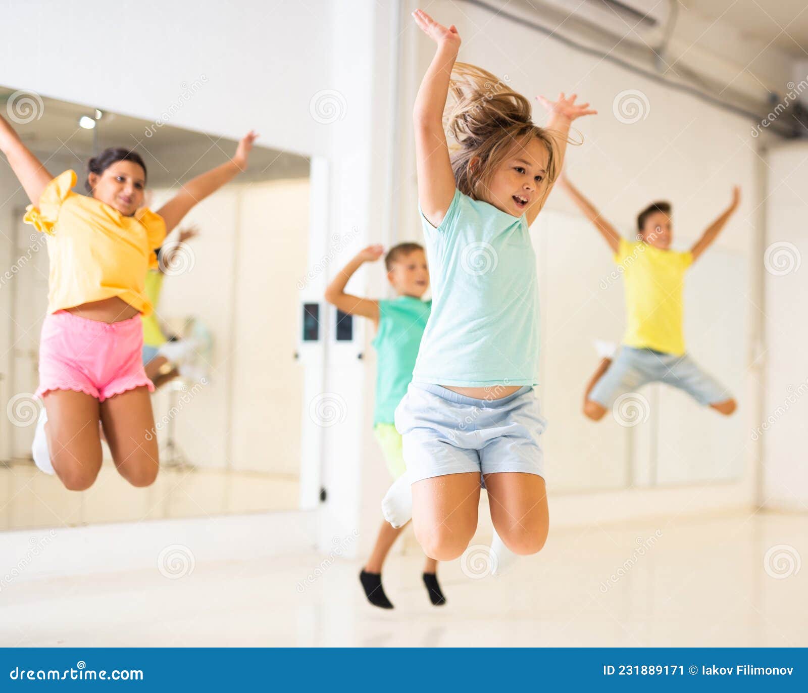 Kids Jumping in Dance Studio Stock Image - Image of group, children ...