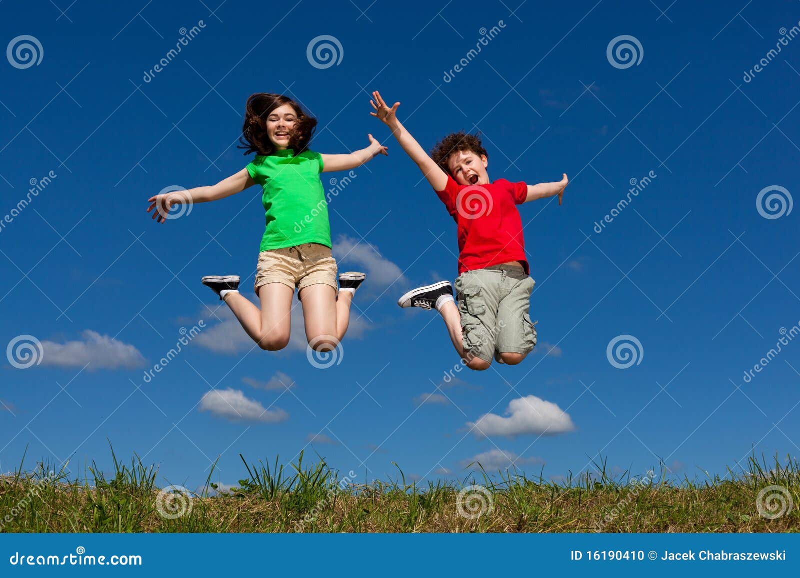 Kids Jumping Outdoor Stock Photo - Image: 16190410