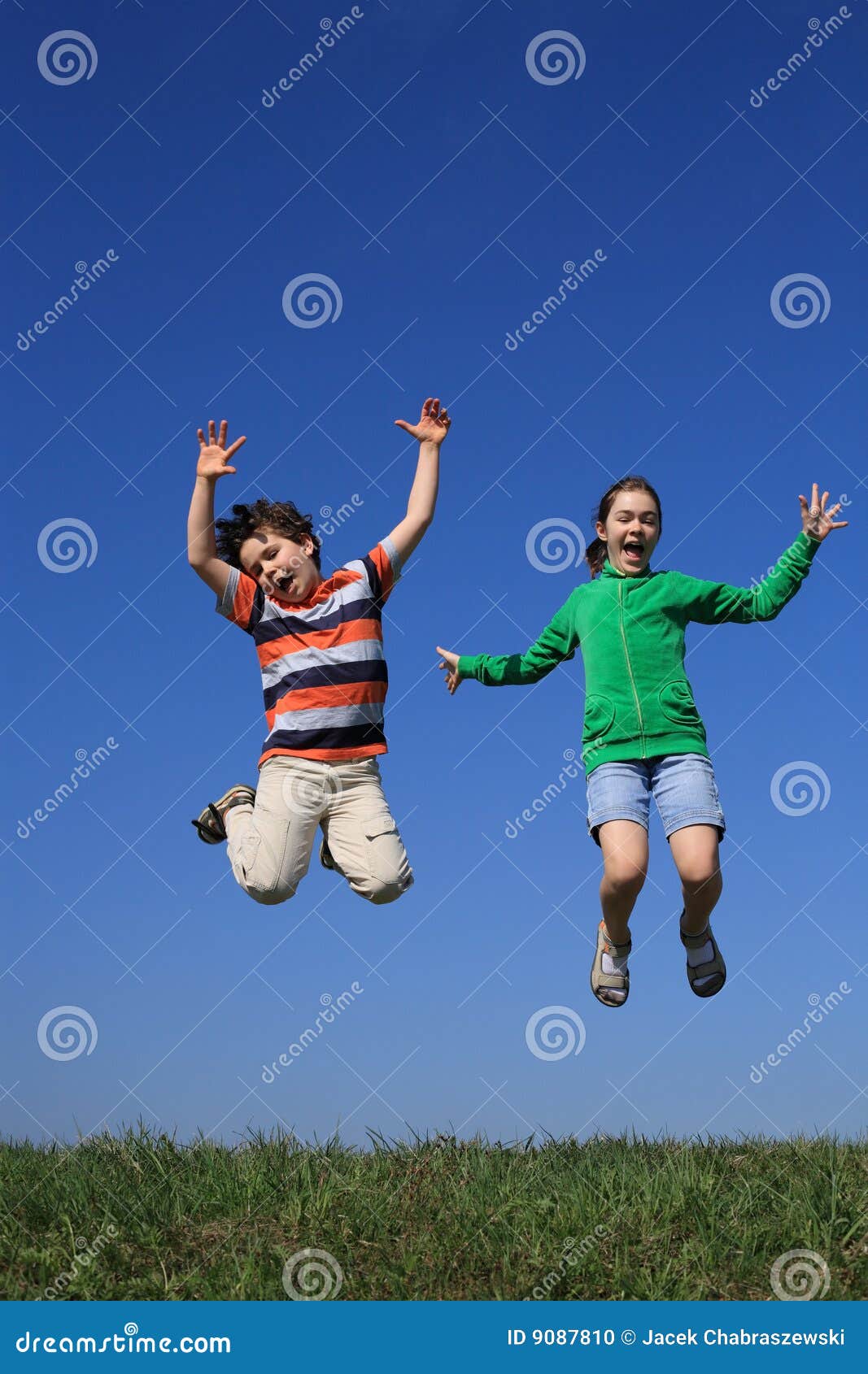 Kids jumping outdoor stock photo. Image of happy, background - 9087810