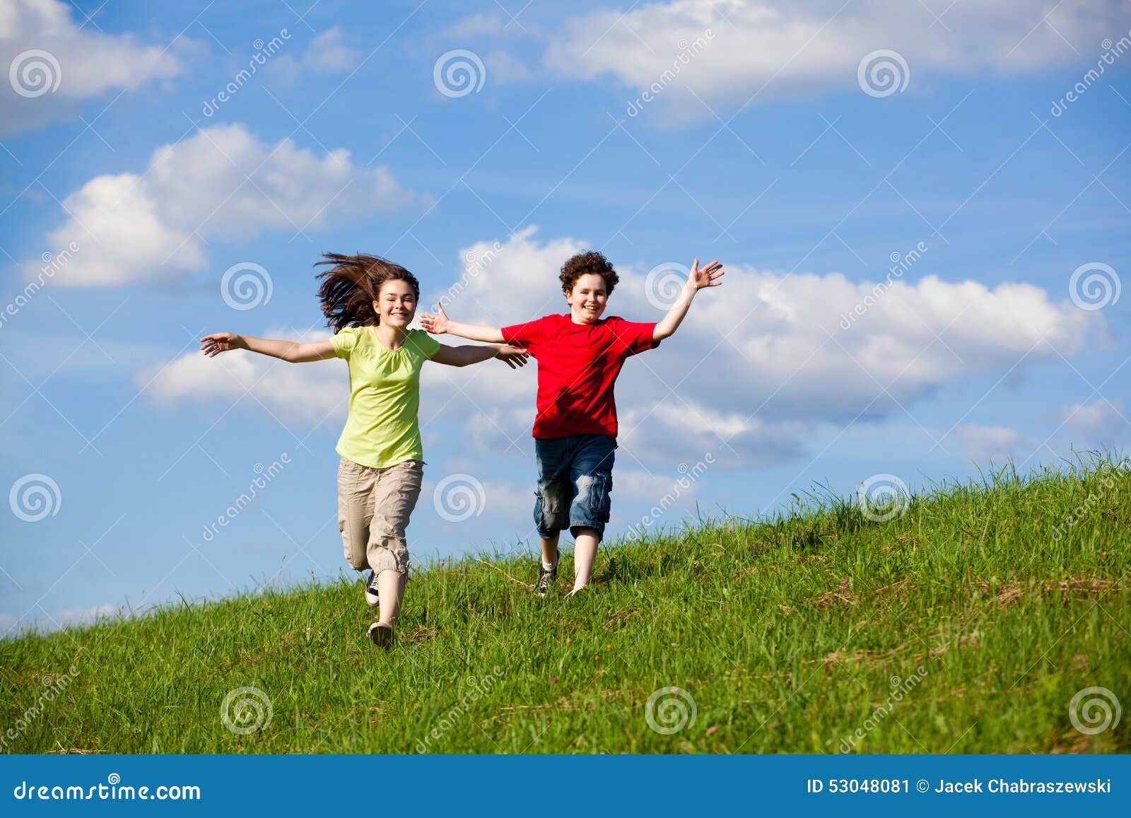Kids jumping outdoor stock image. Image of grass, friends - 53048081