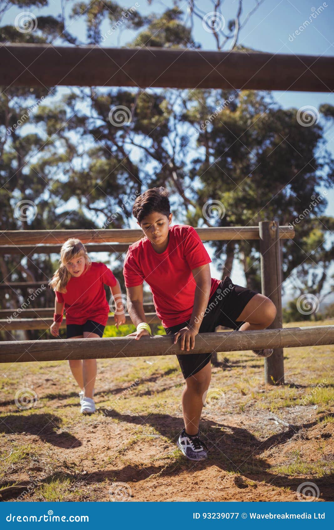 Kids Jumping Over the Hurdles during Obstacle Course Training Stock ...