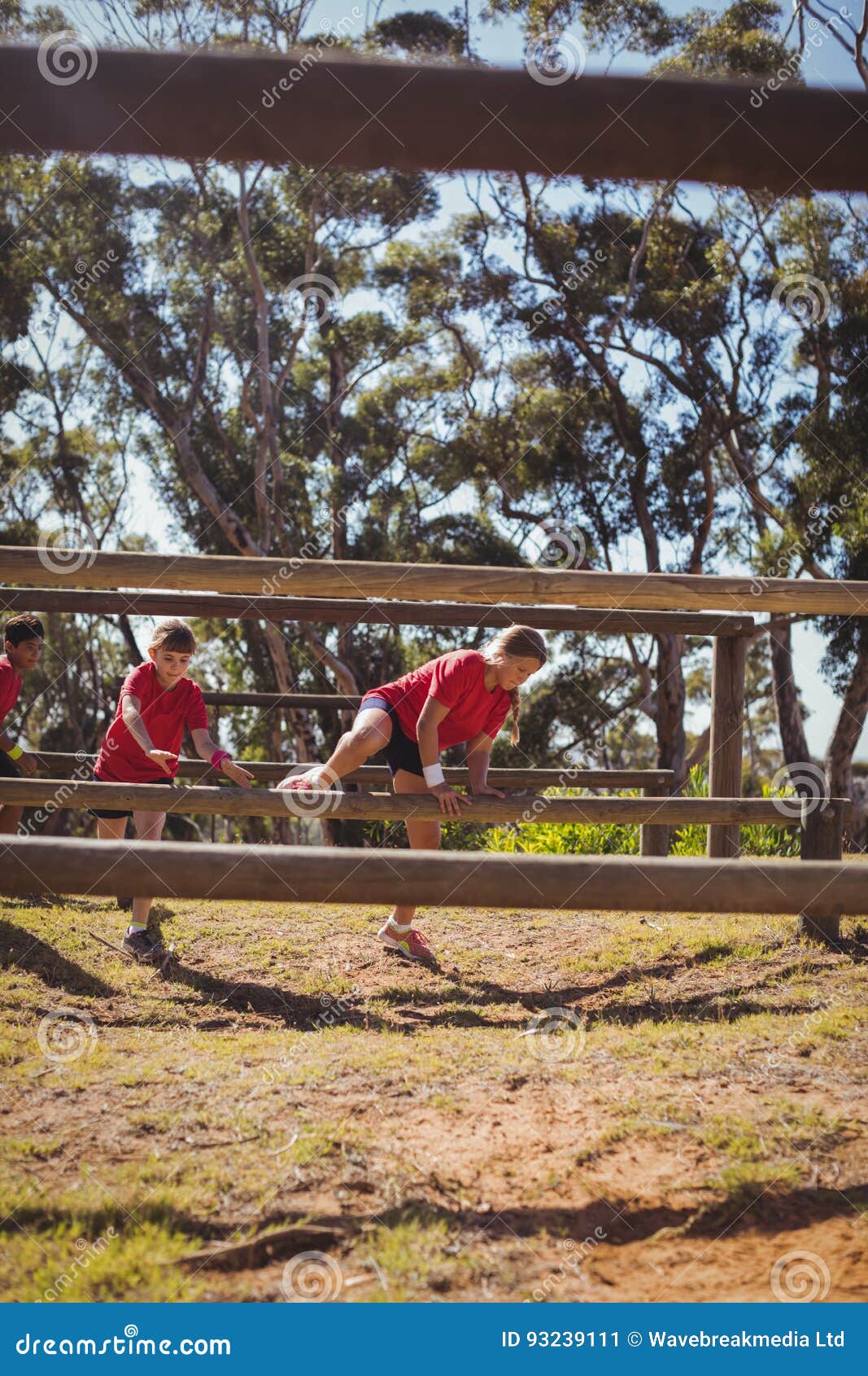 Kids Jumping Over the Hurdles during Obstacle Course Training Stock ...