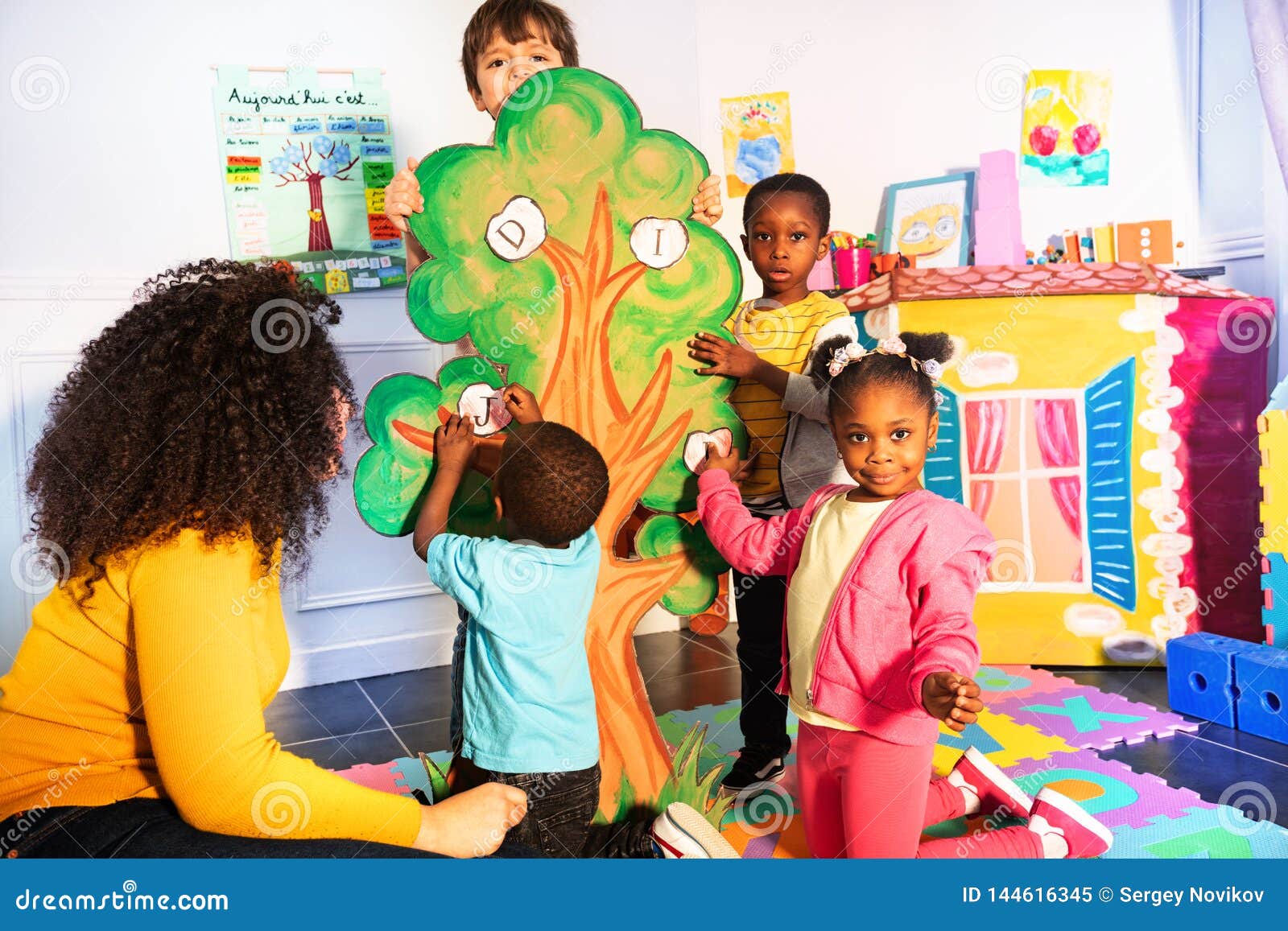 Kids Learn Alphabet by Putting Letters on Tree Stock Image - Image of ...