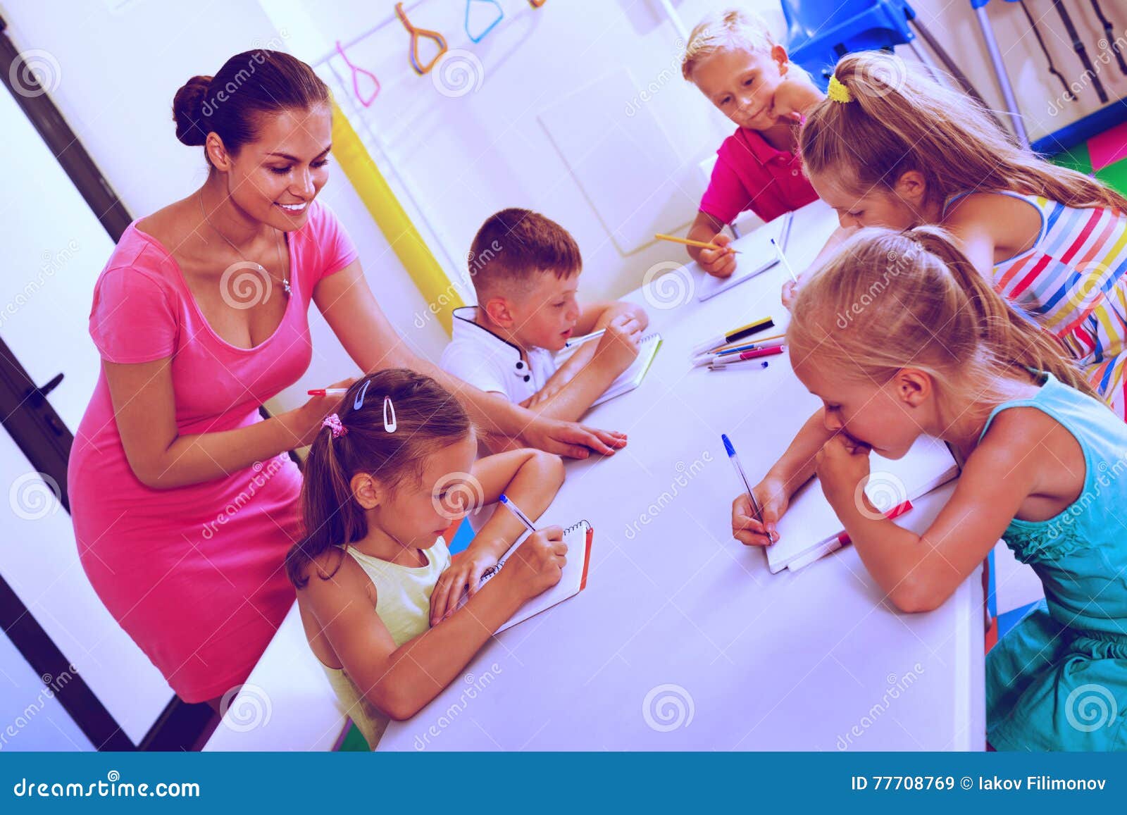 Kids Learning To Write on Lesson in Elementary School Class Stock Image ...