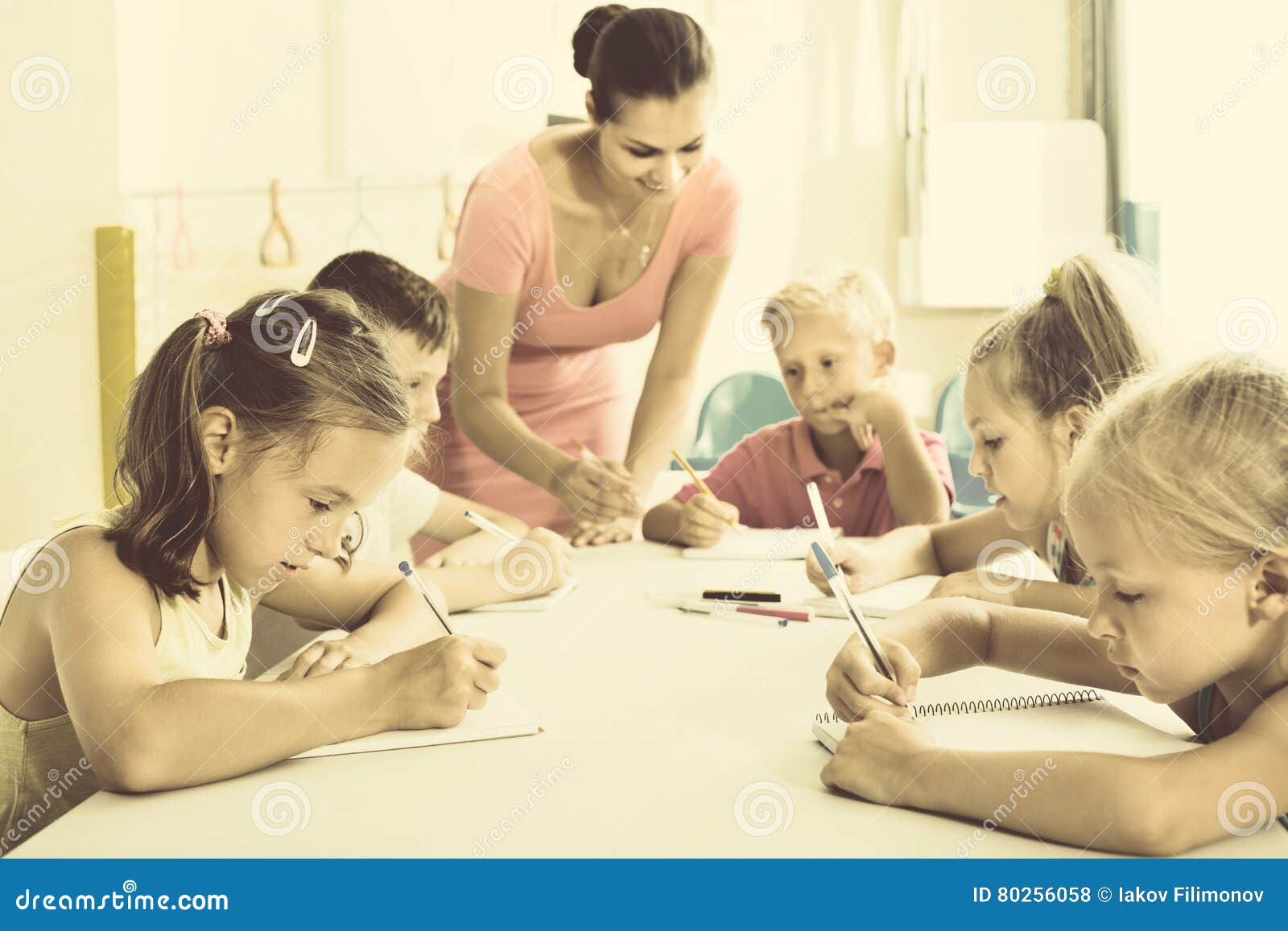 Kids Learning To Write on Lesson in Elementary School Class Stock Photo ...