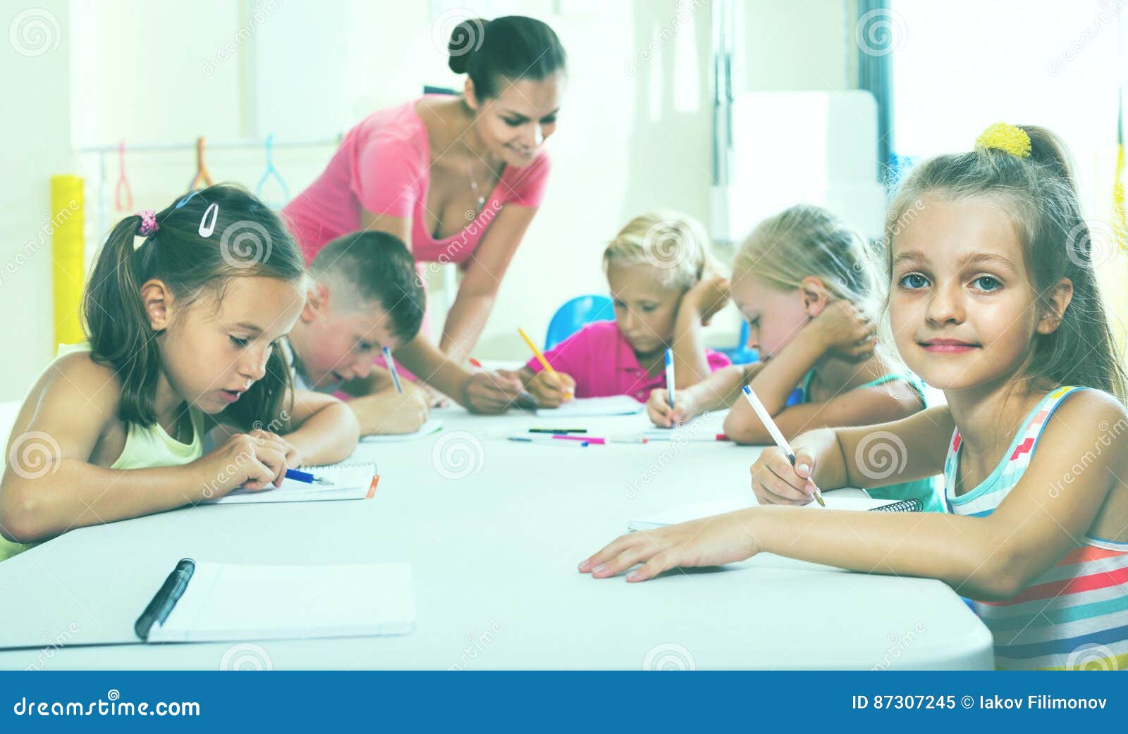 Kids Learning To Write on Lesson in Elementary School Class Stock Image ...