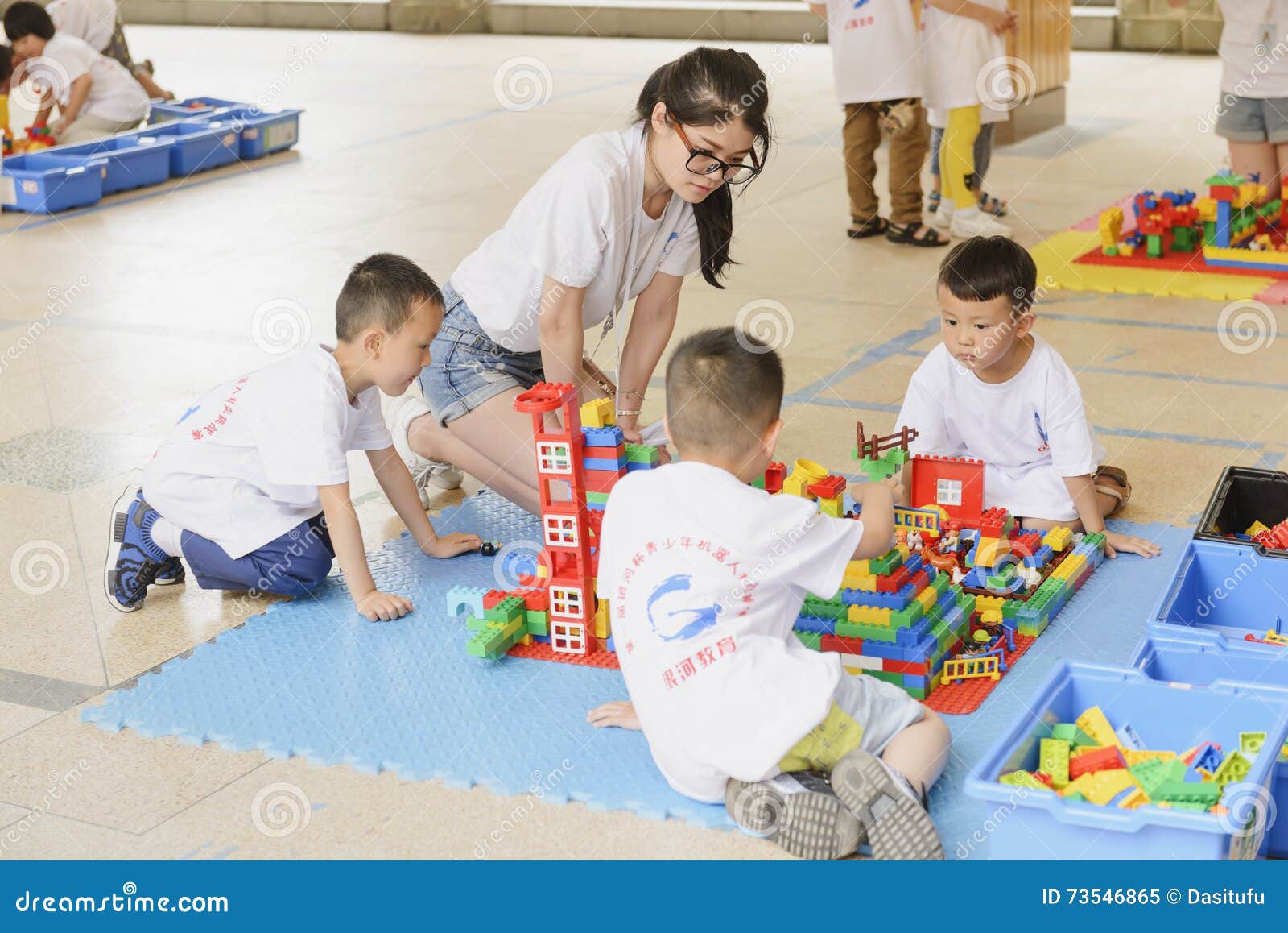 Kids on lego match editorial image. Image of china, team - 73546865