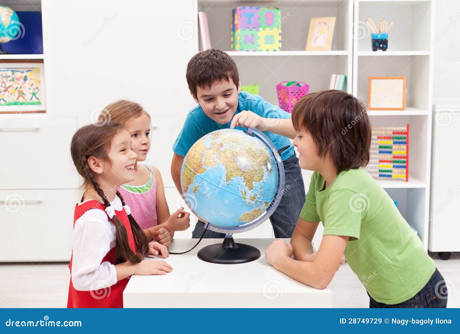 Kids Looking at Earth Globe Stock Image - Image of cute, child: 28749729