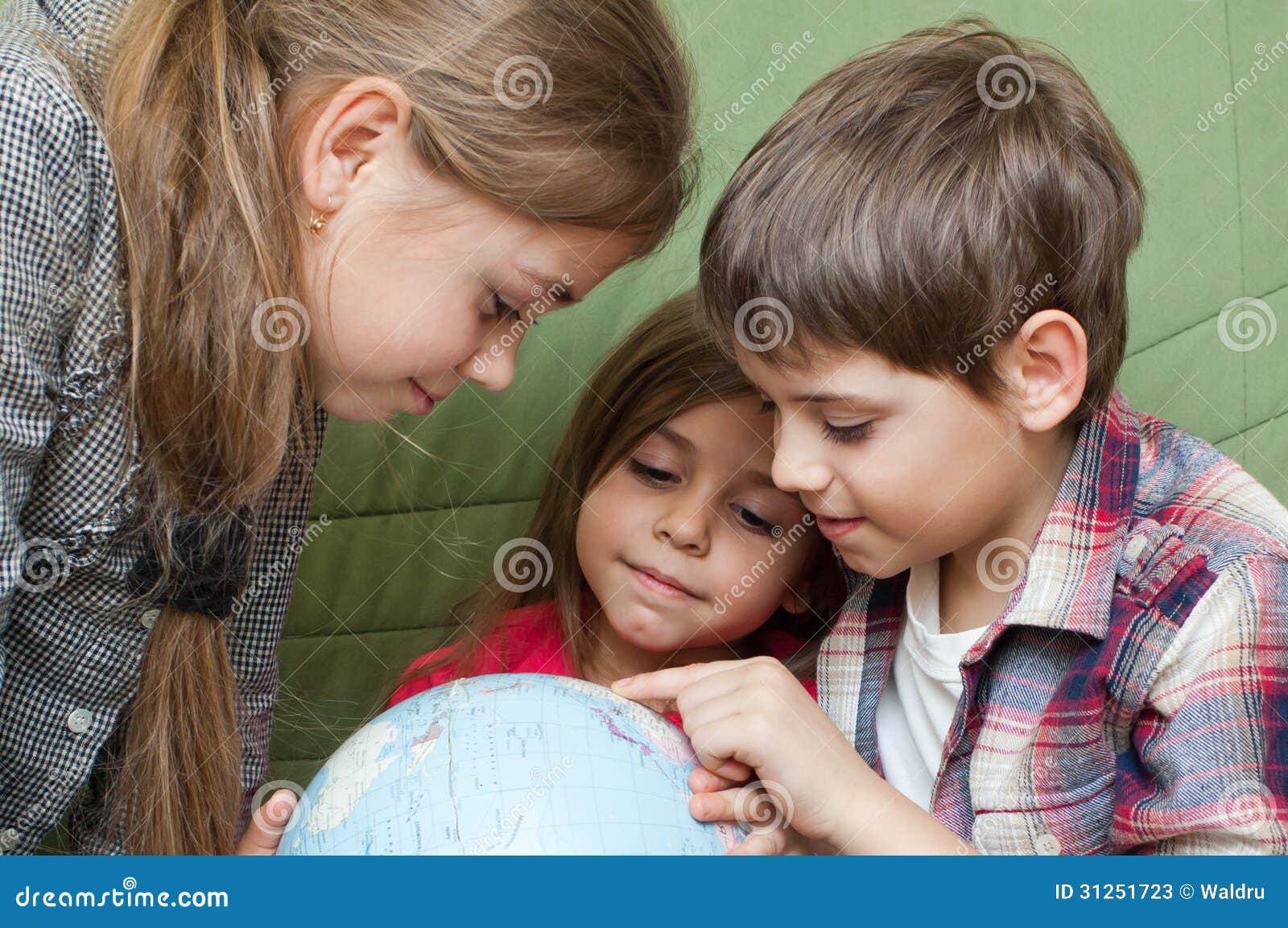 Kids looking at globe stock image. Image of planet, exploration - 31251723