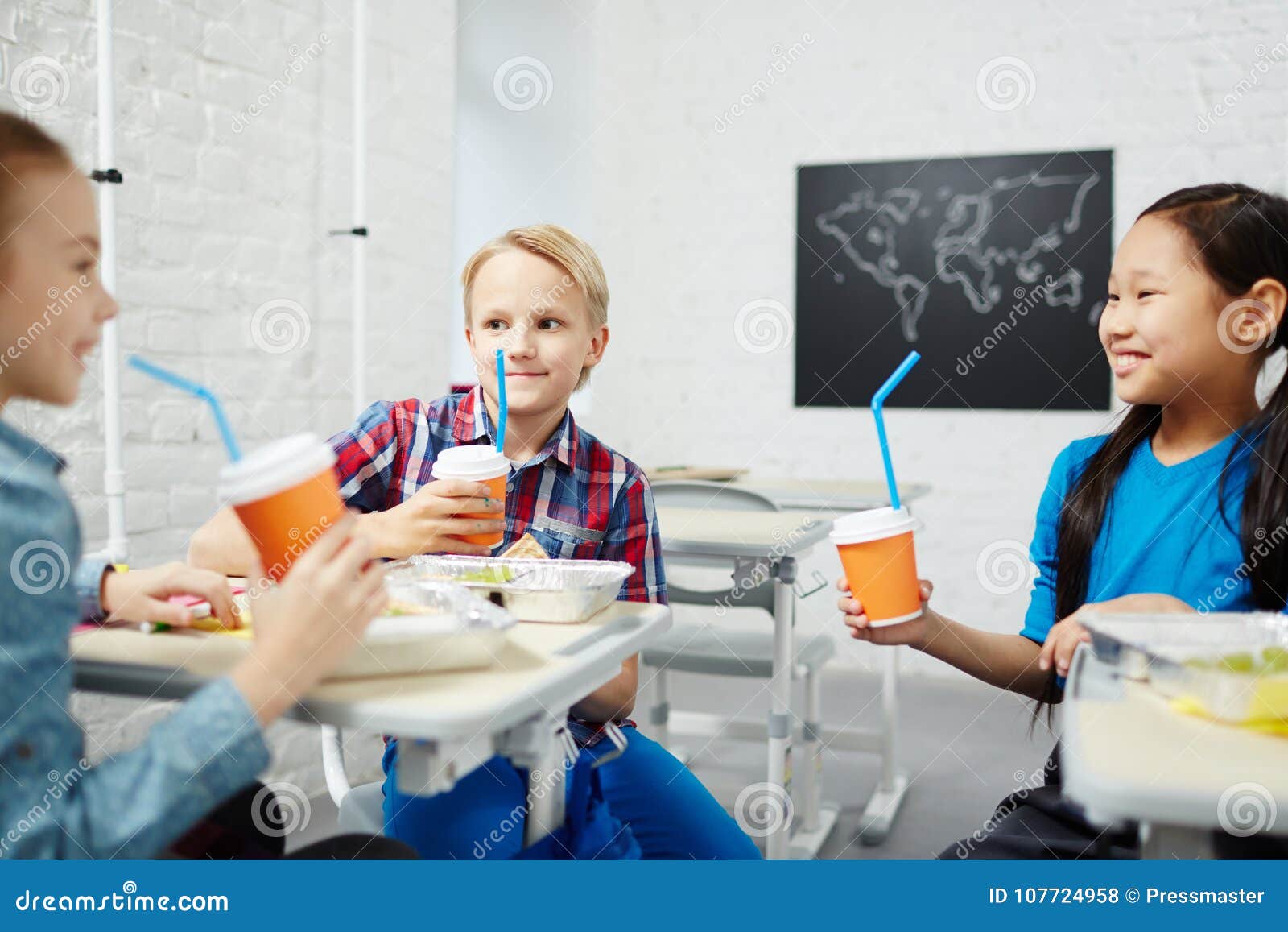 Kids at lunch break stock photo. Image of education - 107724958