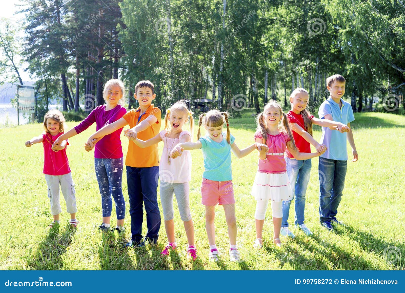 Kids outside in park stock photo. Image of sunny, lawn - 99758272