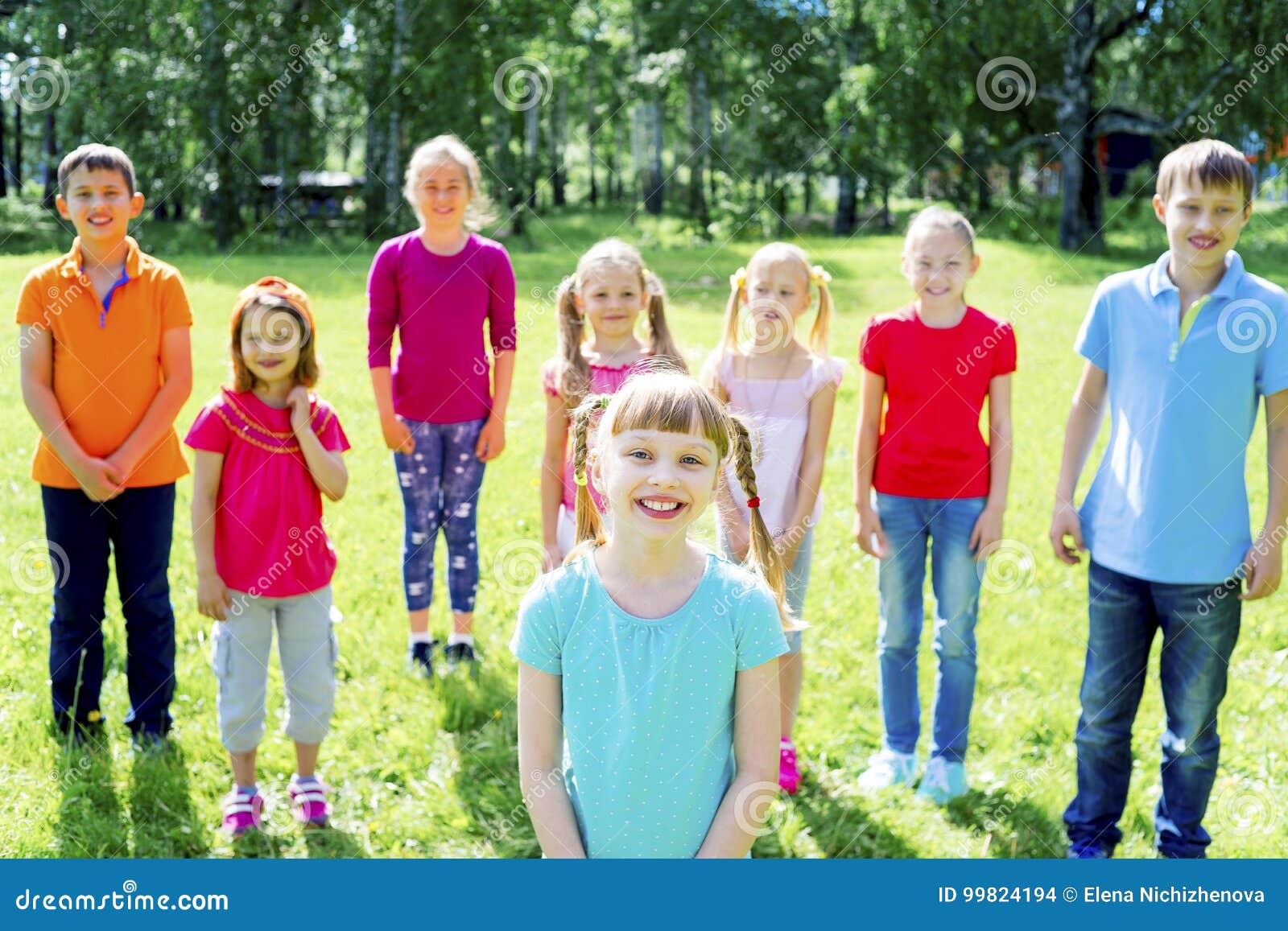 Kids outside in park stock photo. Image of grass, group - 99824194