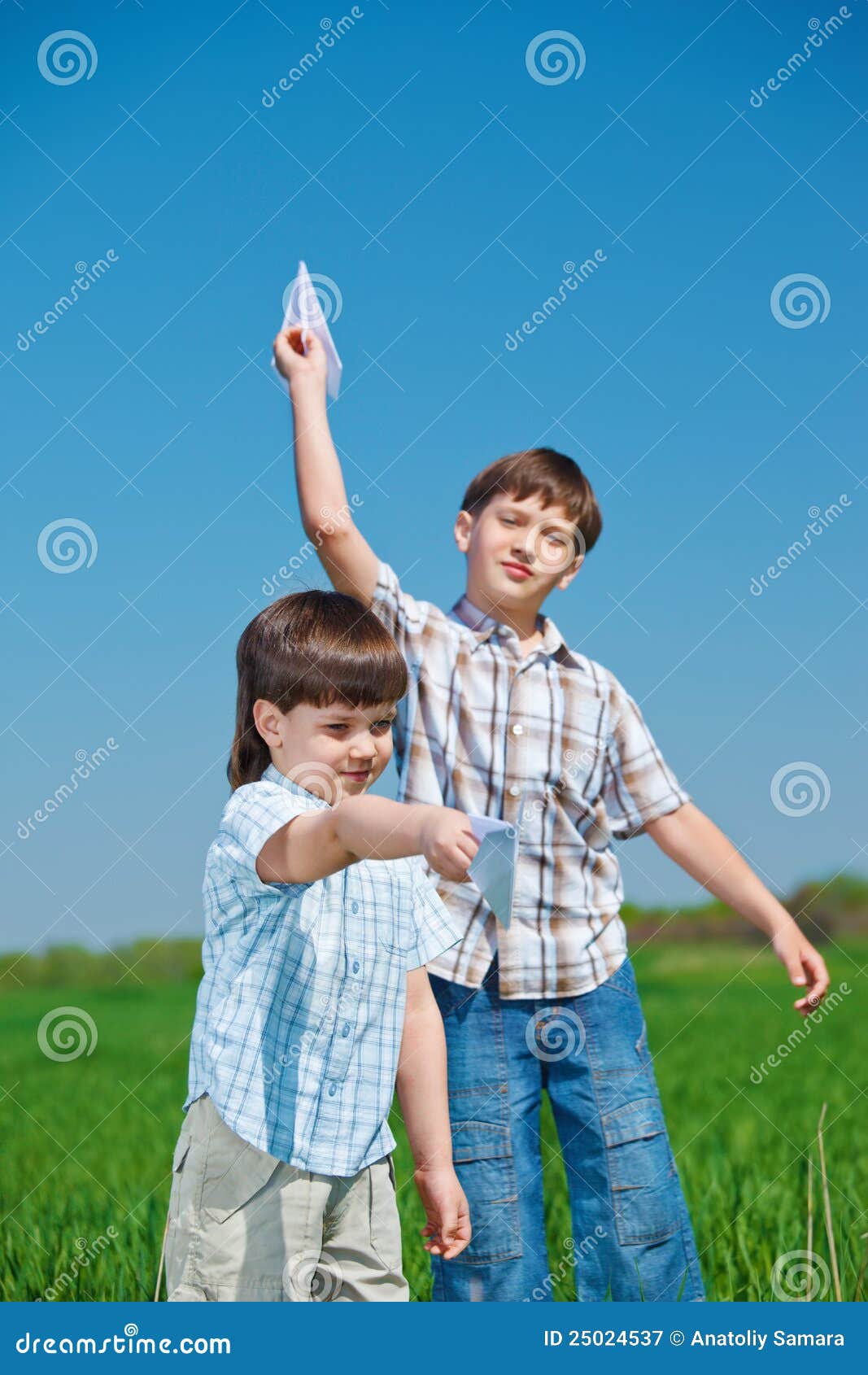 Kids with paper planes stock image. Image of boys, field - 25024537