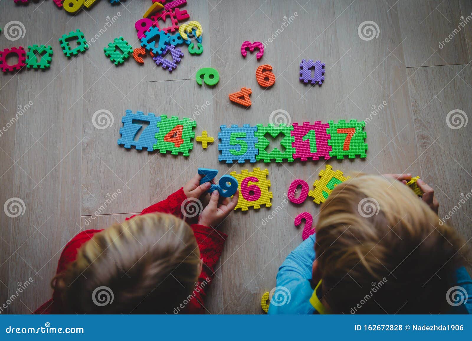 Kids Play with Number Puzzle, Learn Math Stock Photo - Image of collect ...