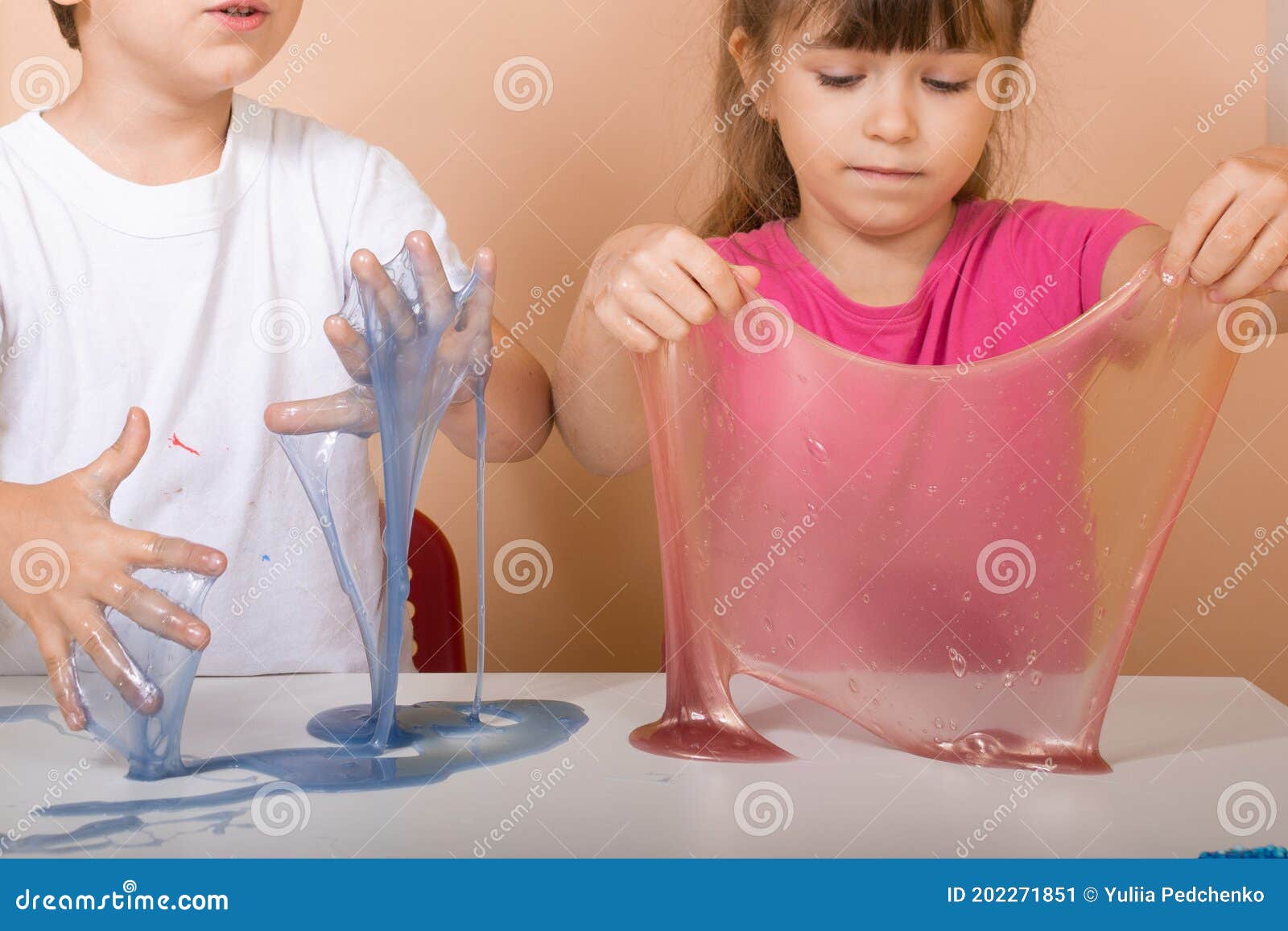 Kids play with slime. stock image. Image of holds, domestic - 202271851