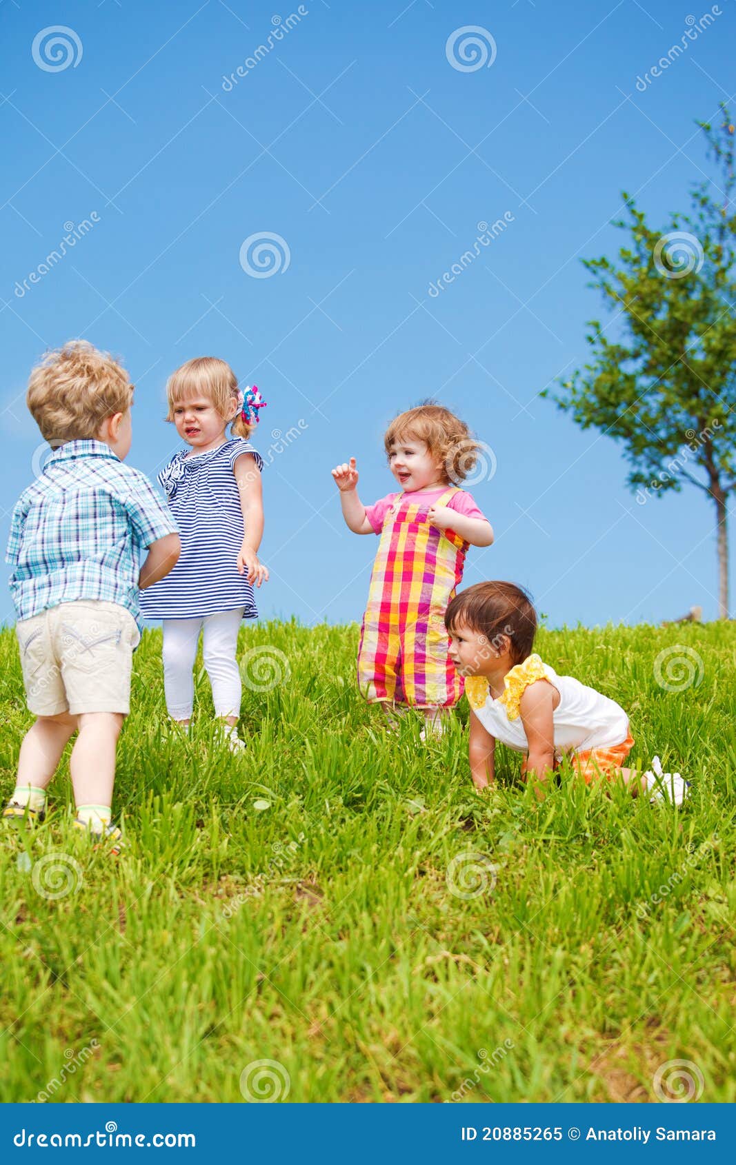 Kids playing stock image. Image of infant, clouds, grass - 20885265