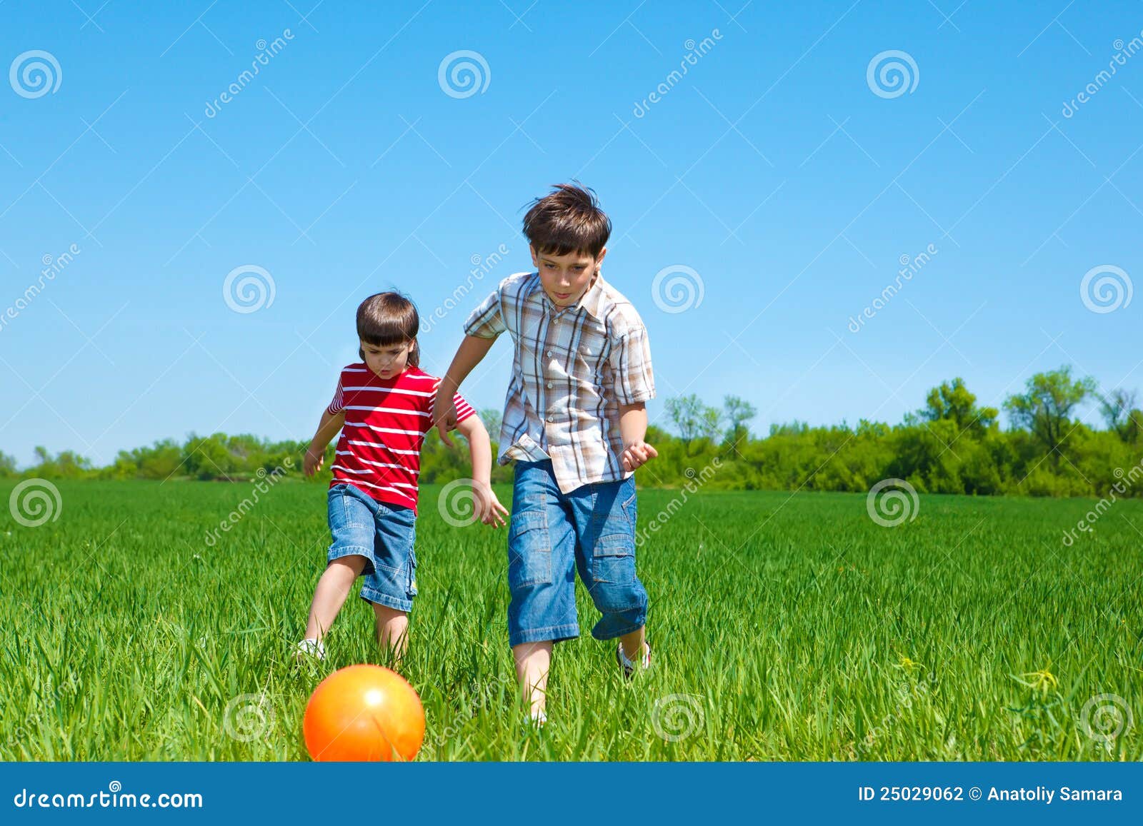 Kids playing with the bal stock photo. Image of countryside - 25029062
