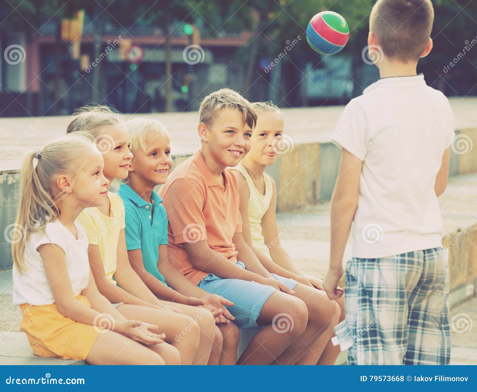 Kids playing ball together stock photo. Image of humor - 79573668