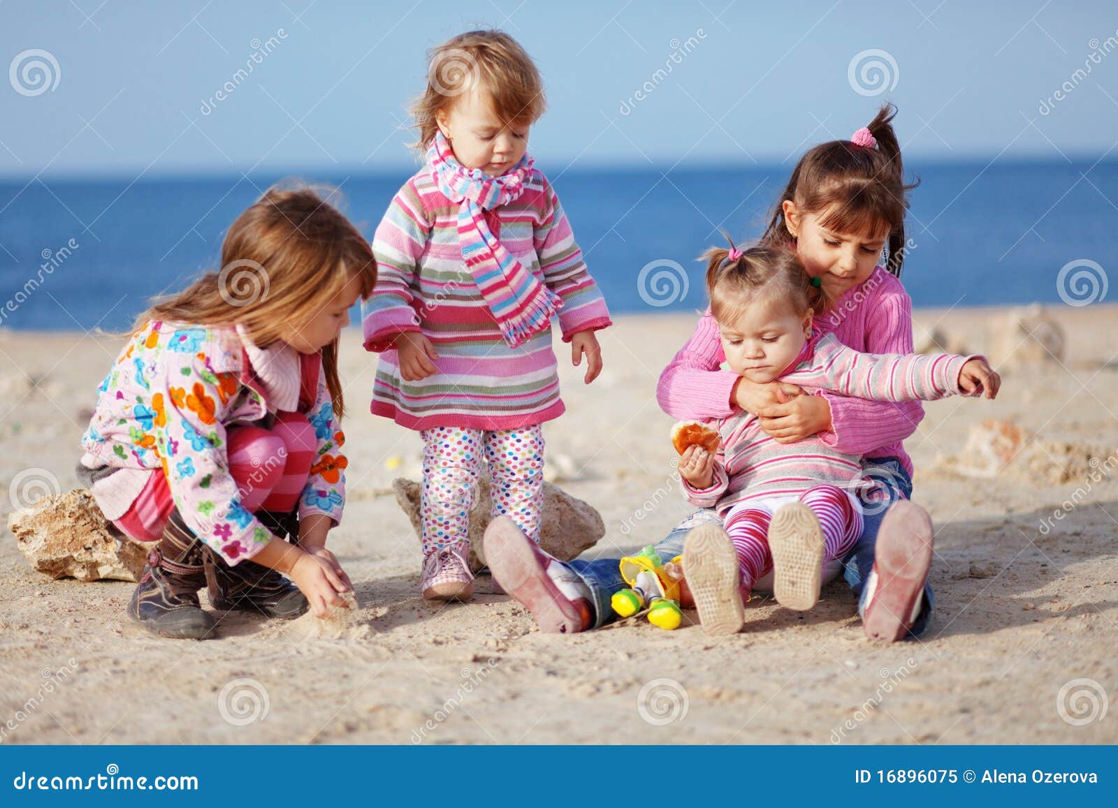 Kids playing at the beach stock image. Image of beach - 16896075