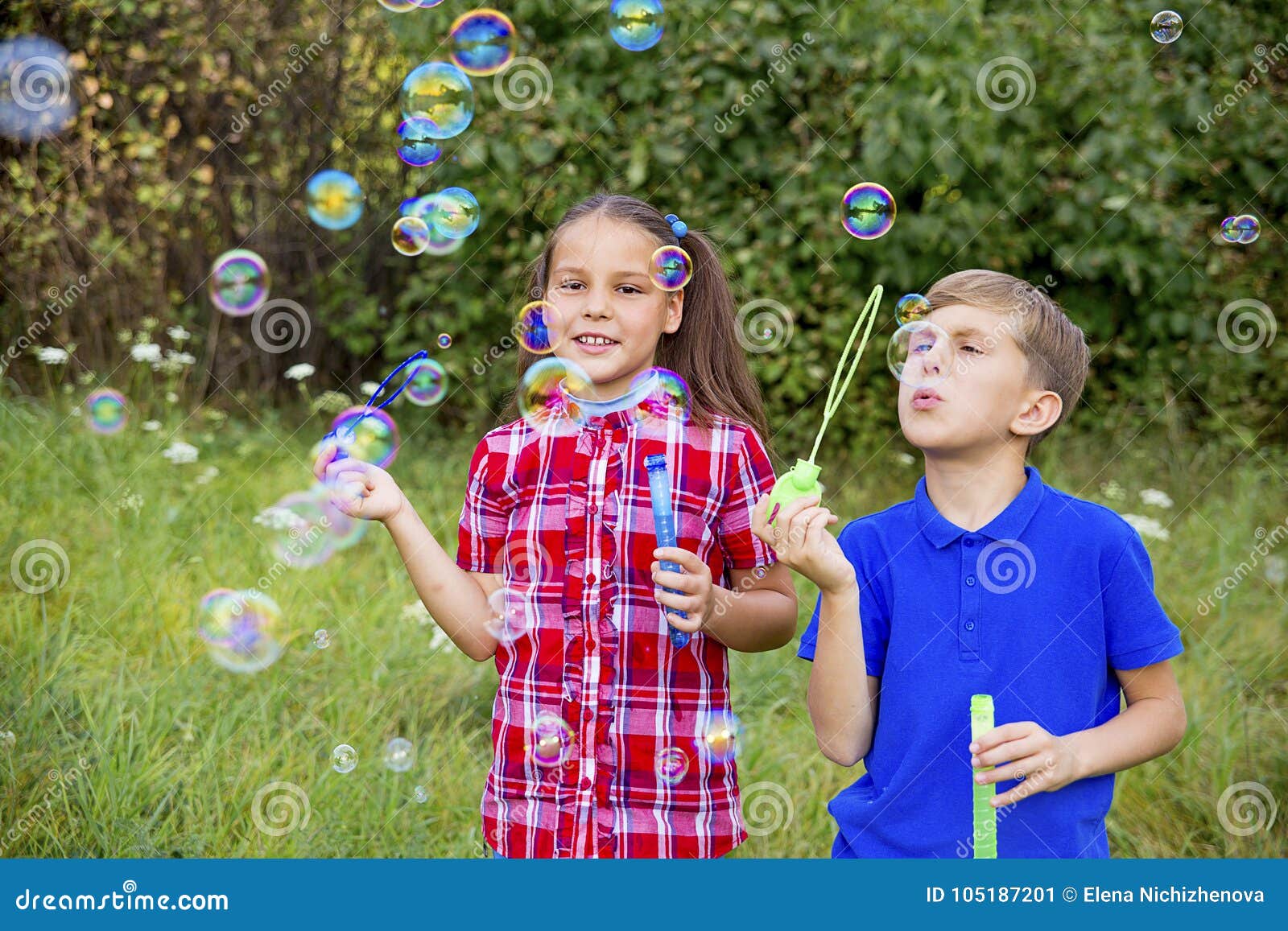 Kids playing with bubbles stock image. Image of happy - 105187201