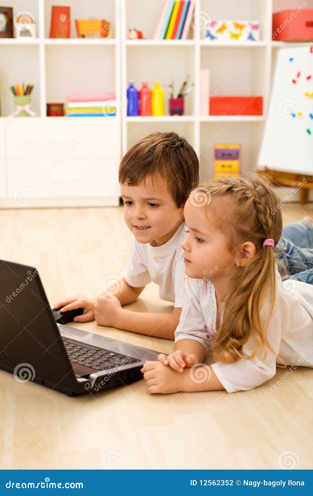 Kids Playing Computer Game on Laptop Stock Photo - Image of family ...