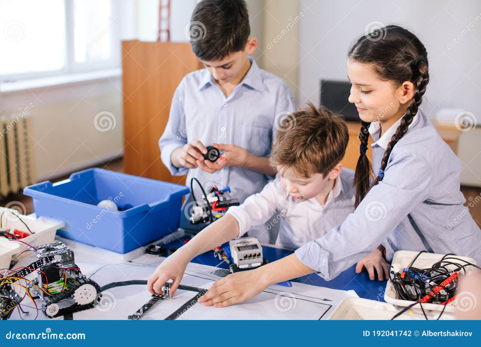 Kids Playing with Electrical Robot while Visiting Robotics Exhibition ...