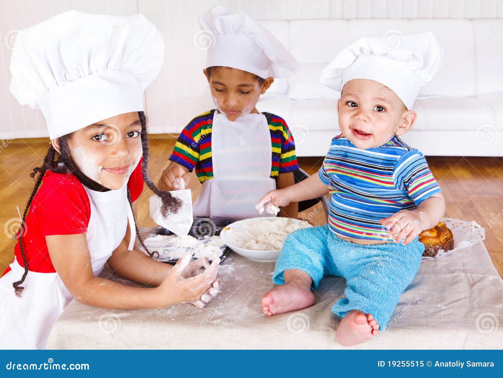 Kids playing with flour stock image. Image of apron, cheerful - 19255515