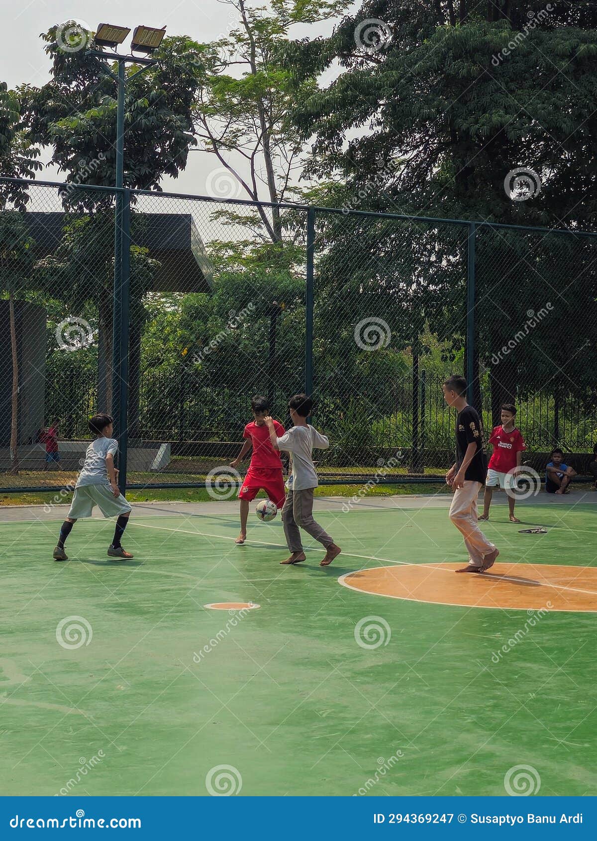 Kids Futsal Training. Indoor Soccer Players Training With Balls ...