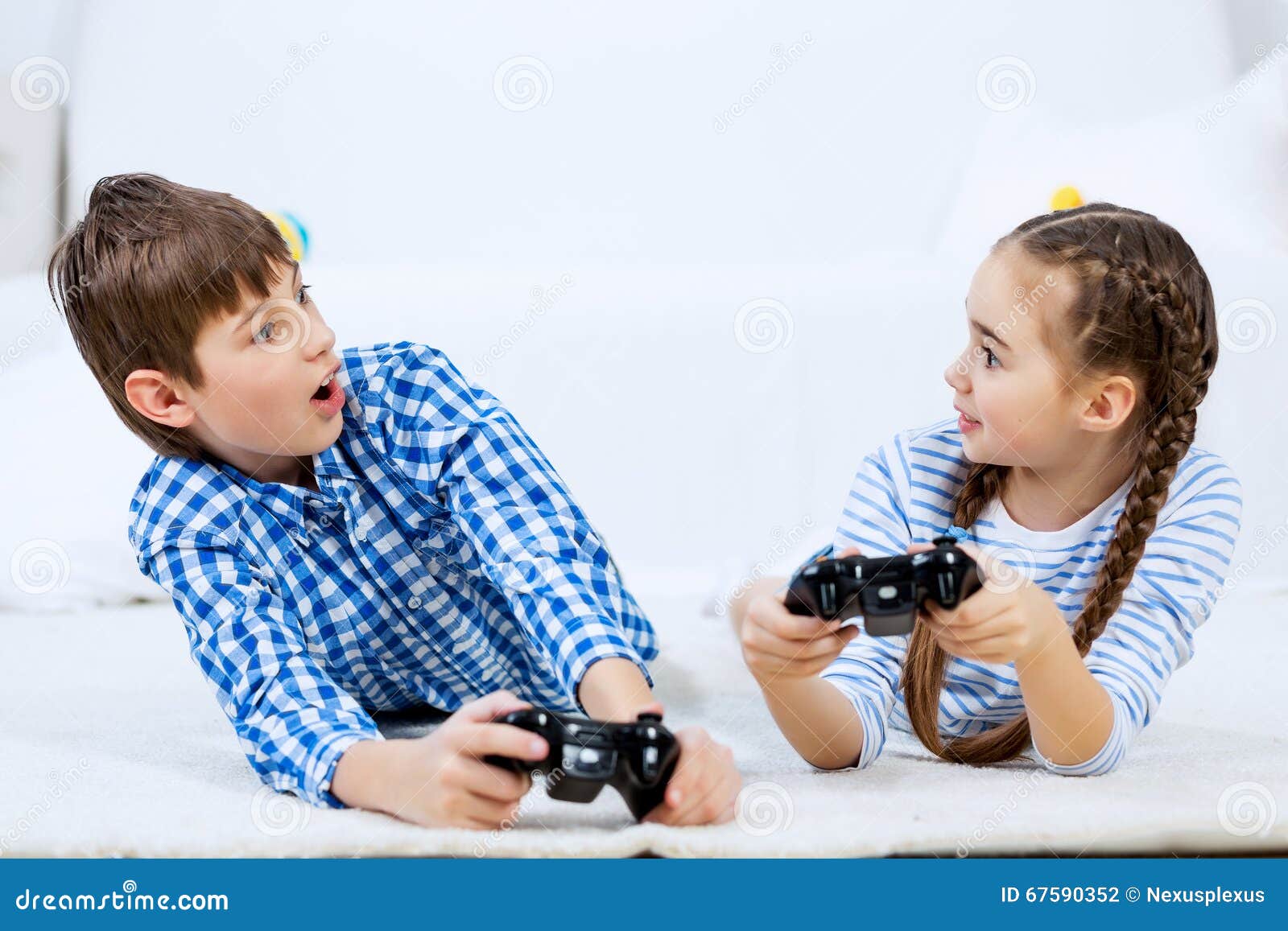 Kids playing game console stock photo. Image of game - 67590352