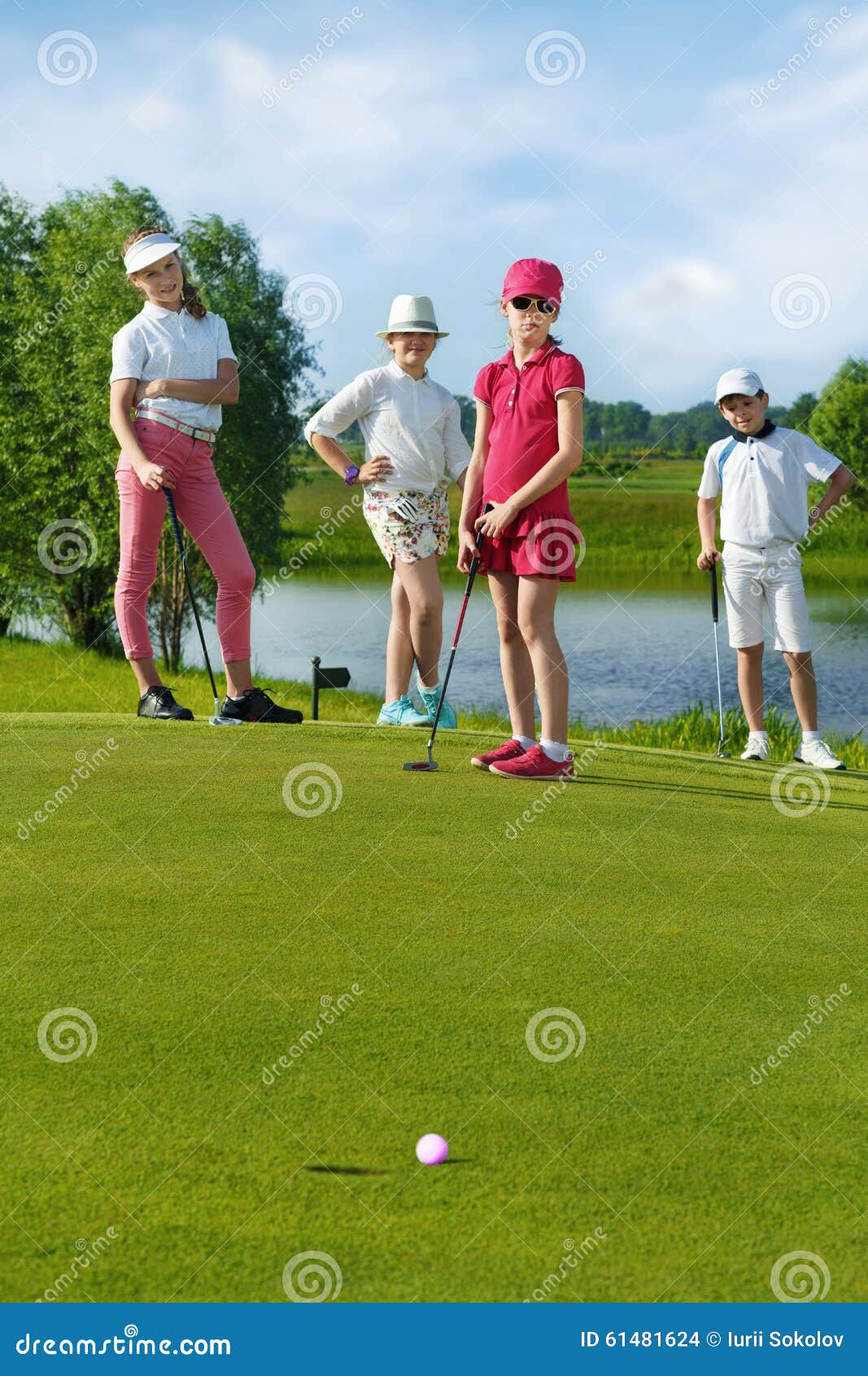 Kids playing golf stock photo. Image of grass, club, people - 61481624