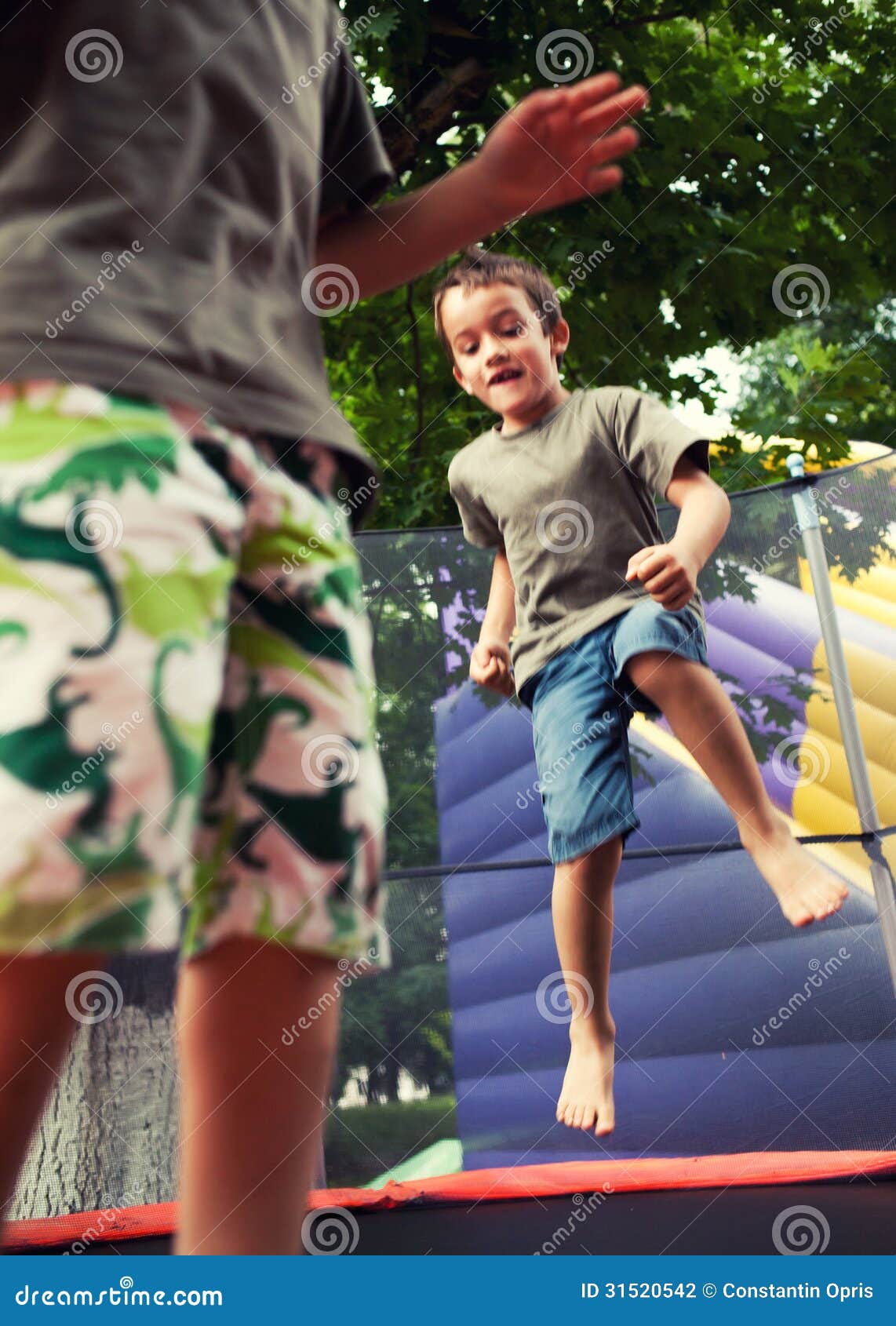 Kids playing and jumping stock photo. Image of high, childhood - 31520542