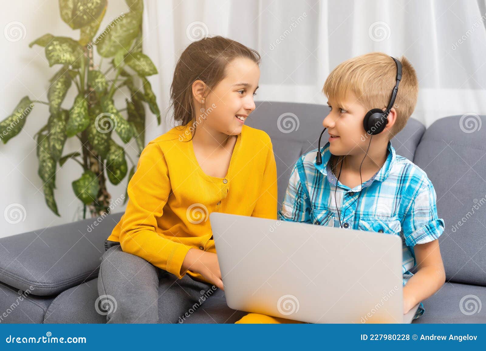 Kids Playing with Laptop Computer at Home Stock Photo - Image of female ...