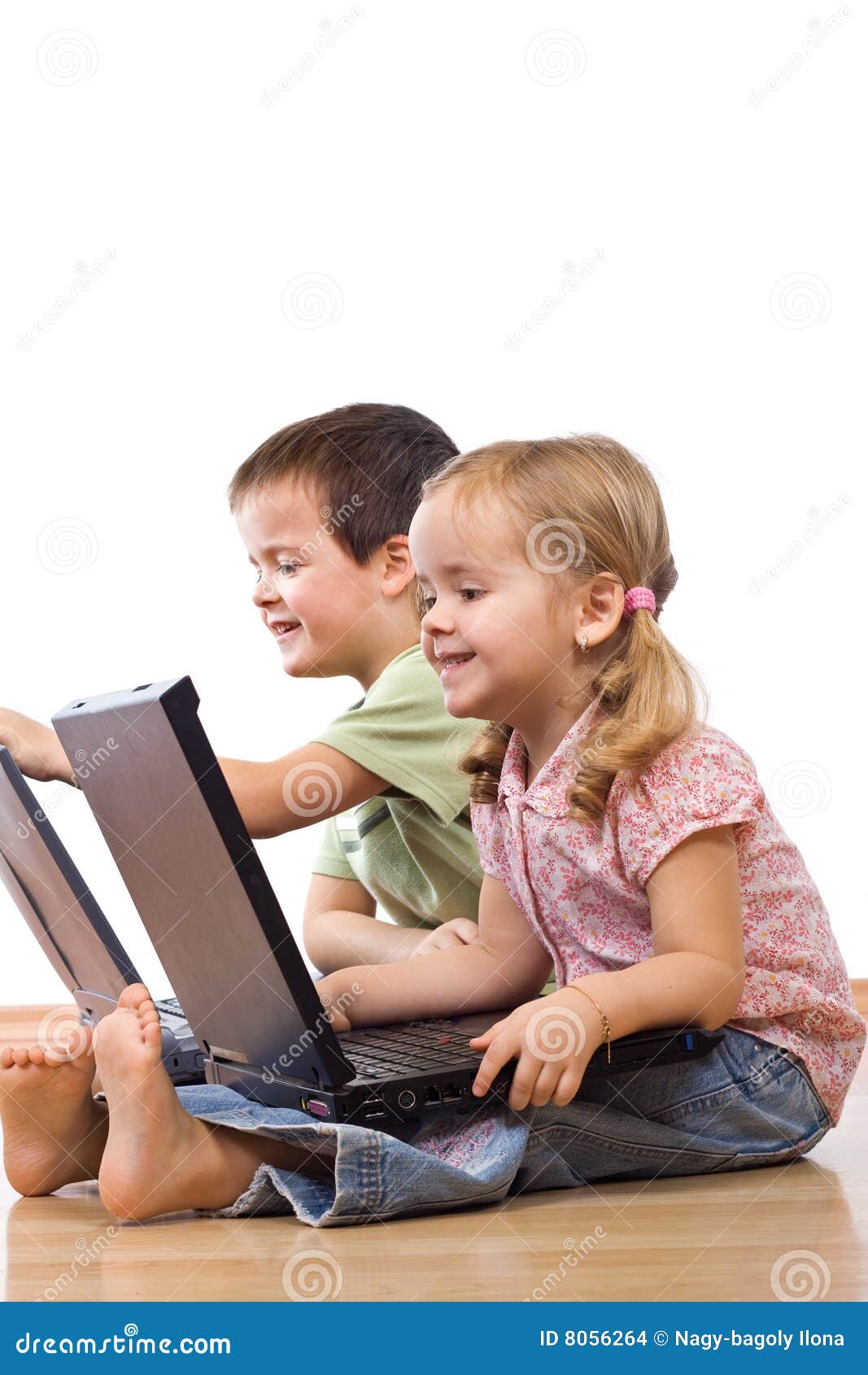 Kids playing on laptops stock photo. Image of floor, childhood - 8056264