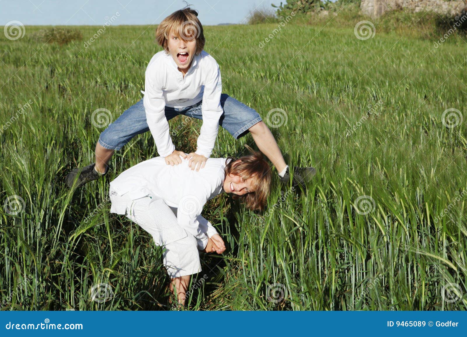 Kids playing leapfrog stock image. Image of frog, camp - 9465089