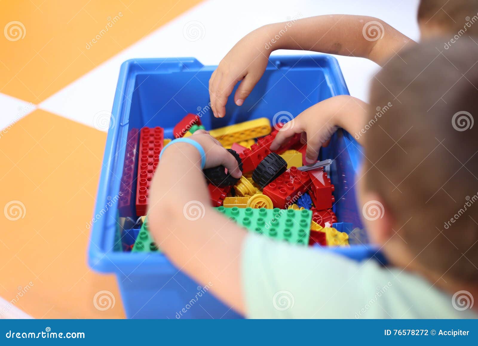 The Boy Is Playing Lego. Developing Occupation For The Child Royalty ...