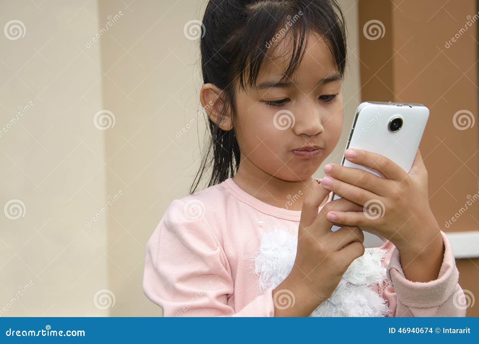 Kids playing phone stock photo. Image of gaming, phone - 46940674