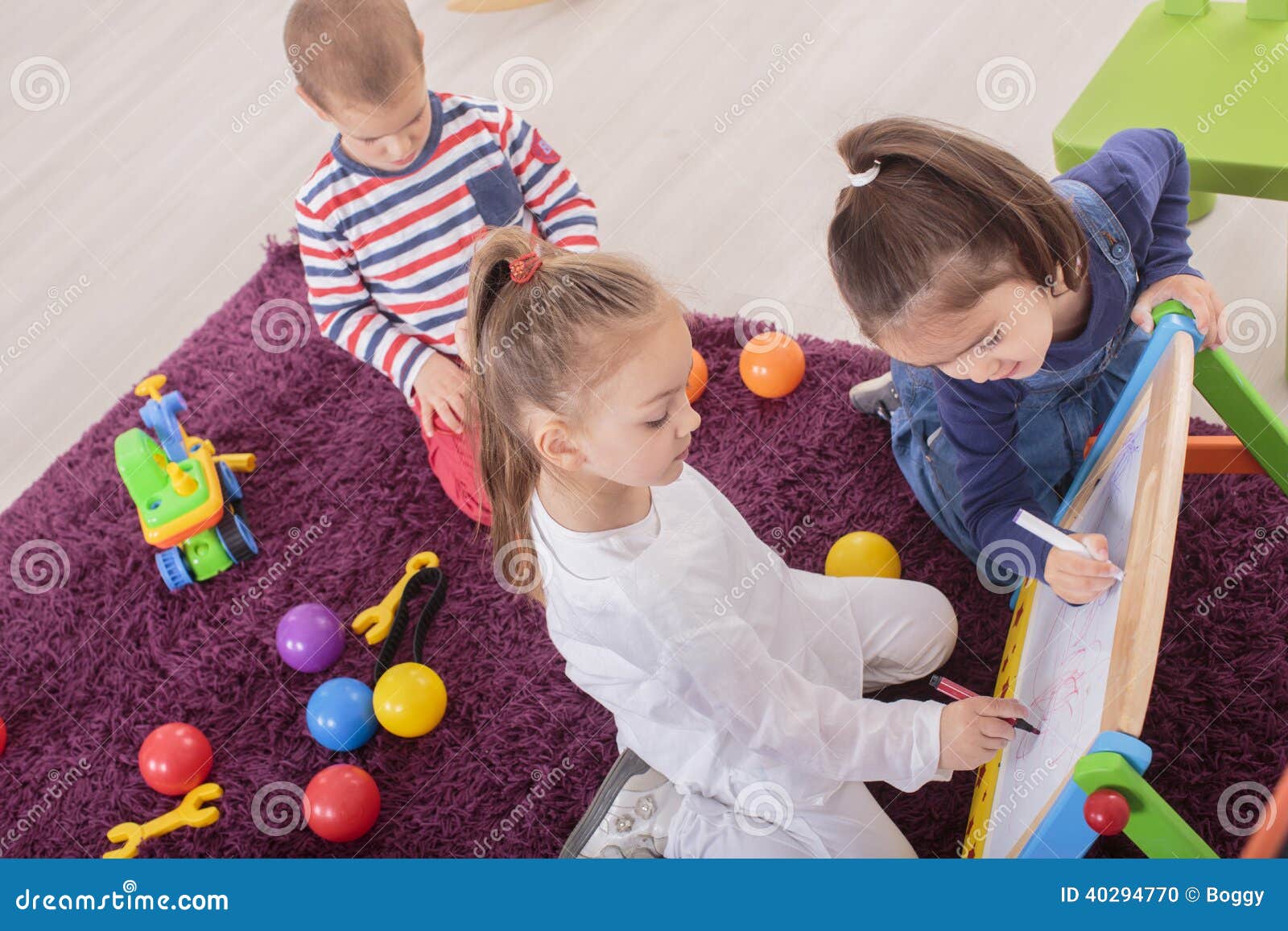 Kids playing in the room stock photo. Image of paint - 40294770