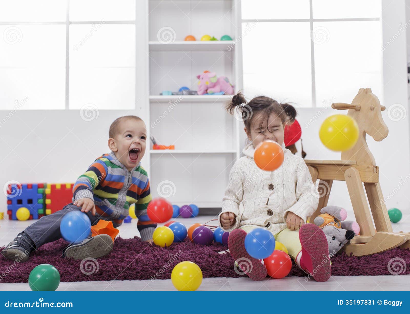 Kids playing in the room stock image. Image of living - 35197831