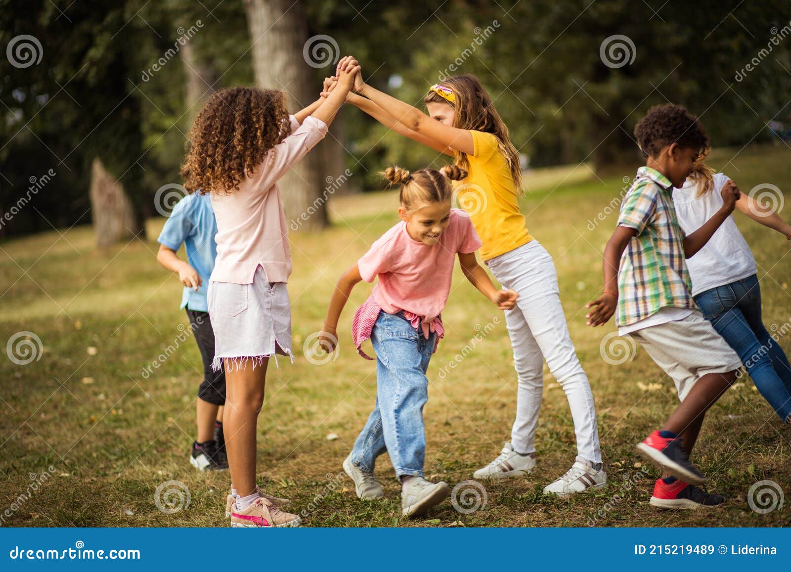 Kids playing in schoolyard stock image. Image of boys - 215219489