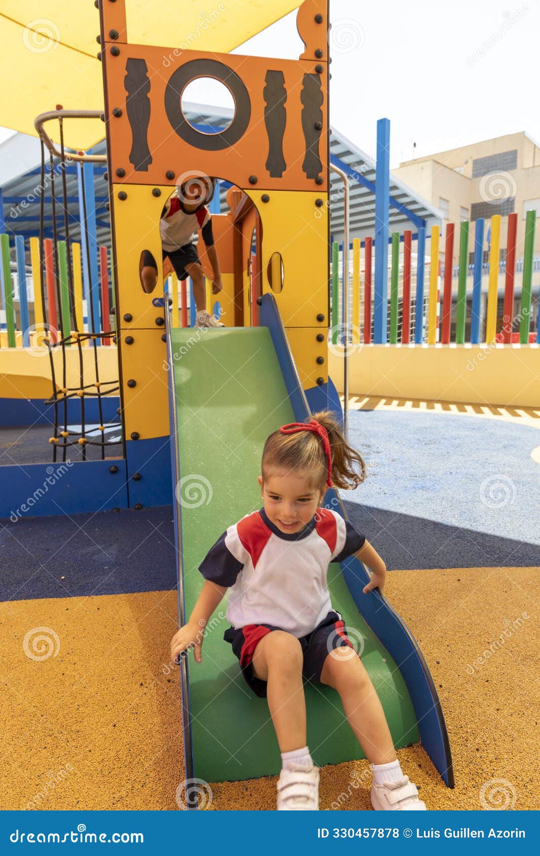 Kids Playing in a Slide at School Stock Photo - Image of growth ...