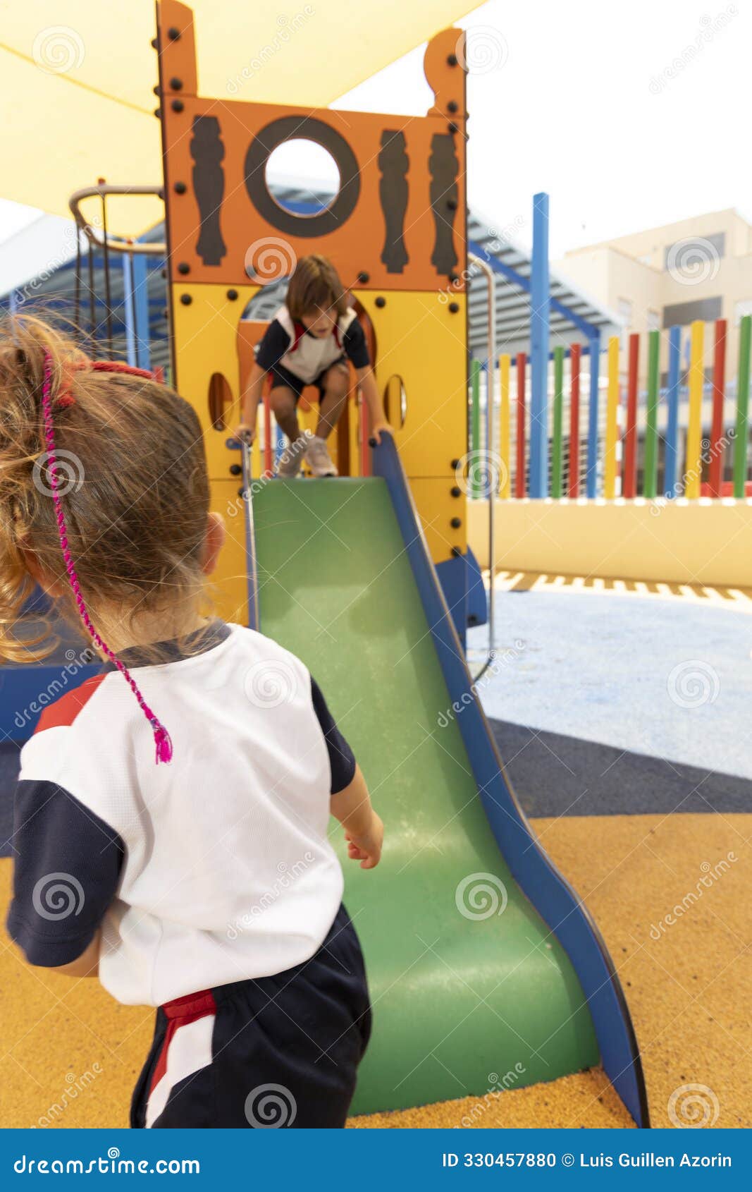 Kids Playing in a Slide at School Stock Photo - Image of colourful ...