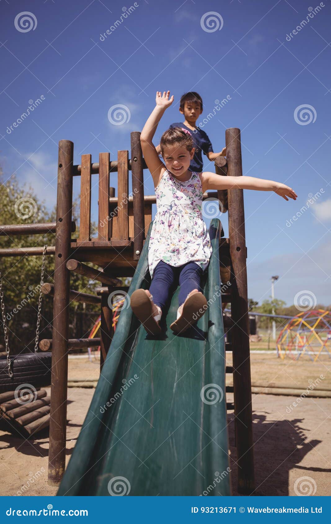 Kids playing on slide stock image. Image of kindergarten - 93213671
