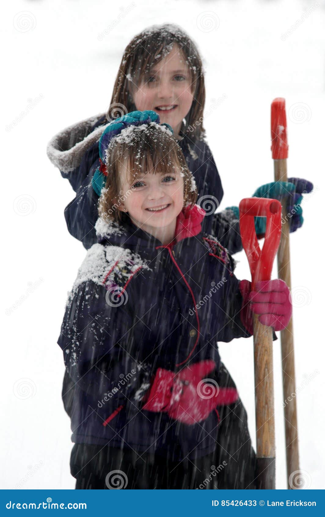Kids Playing in Snow with Snowflakes Falling Stock Image - Image of ...
