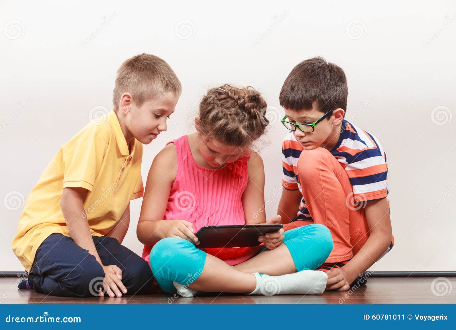 Kids playing on tablet. stock image. Image of childhood - 60781011